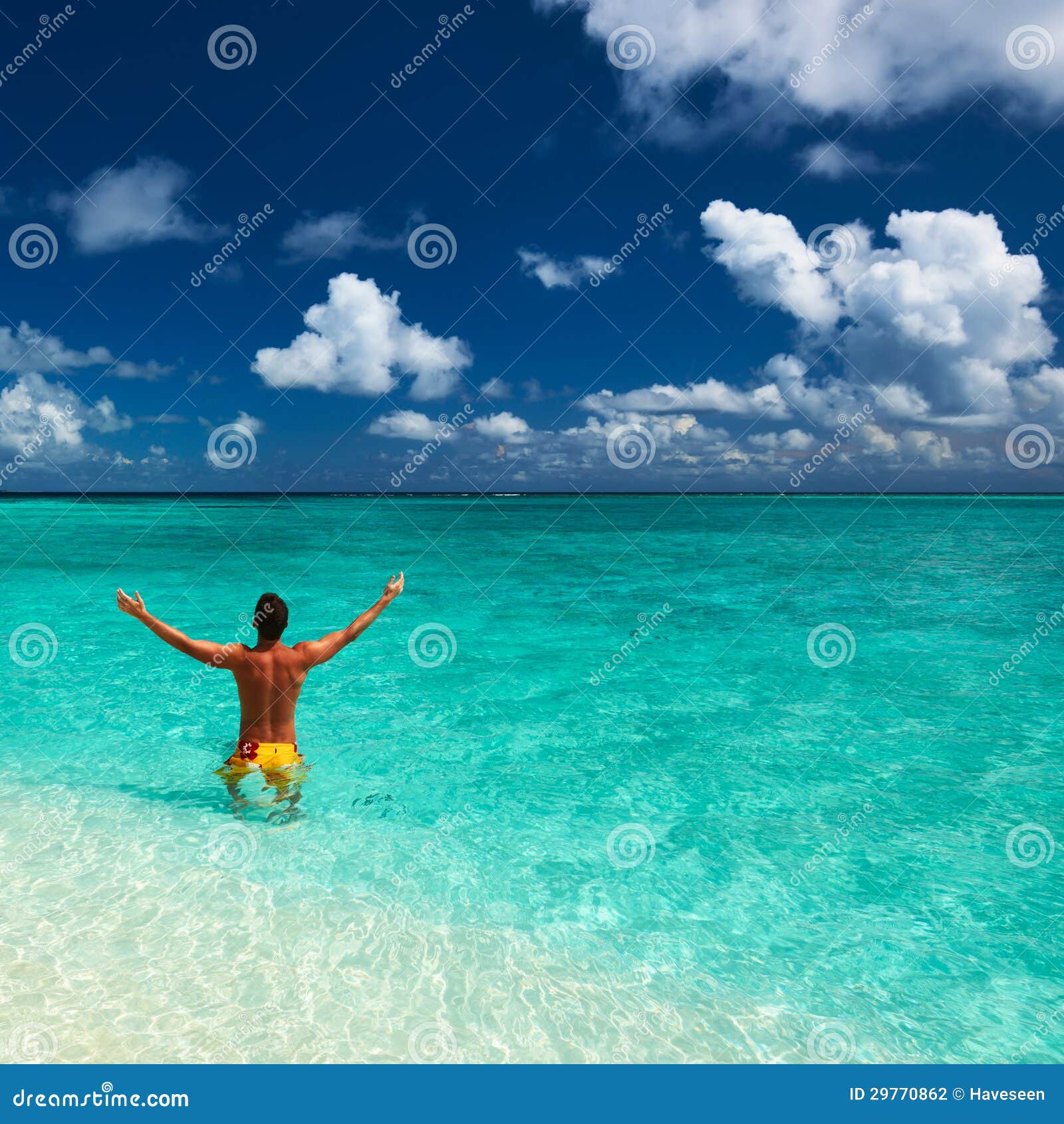 Man at tropical beach stock photo. Image of blue, turquoise - 29770862
