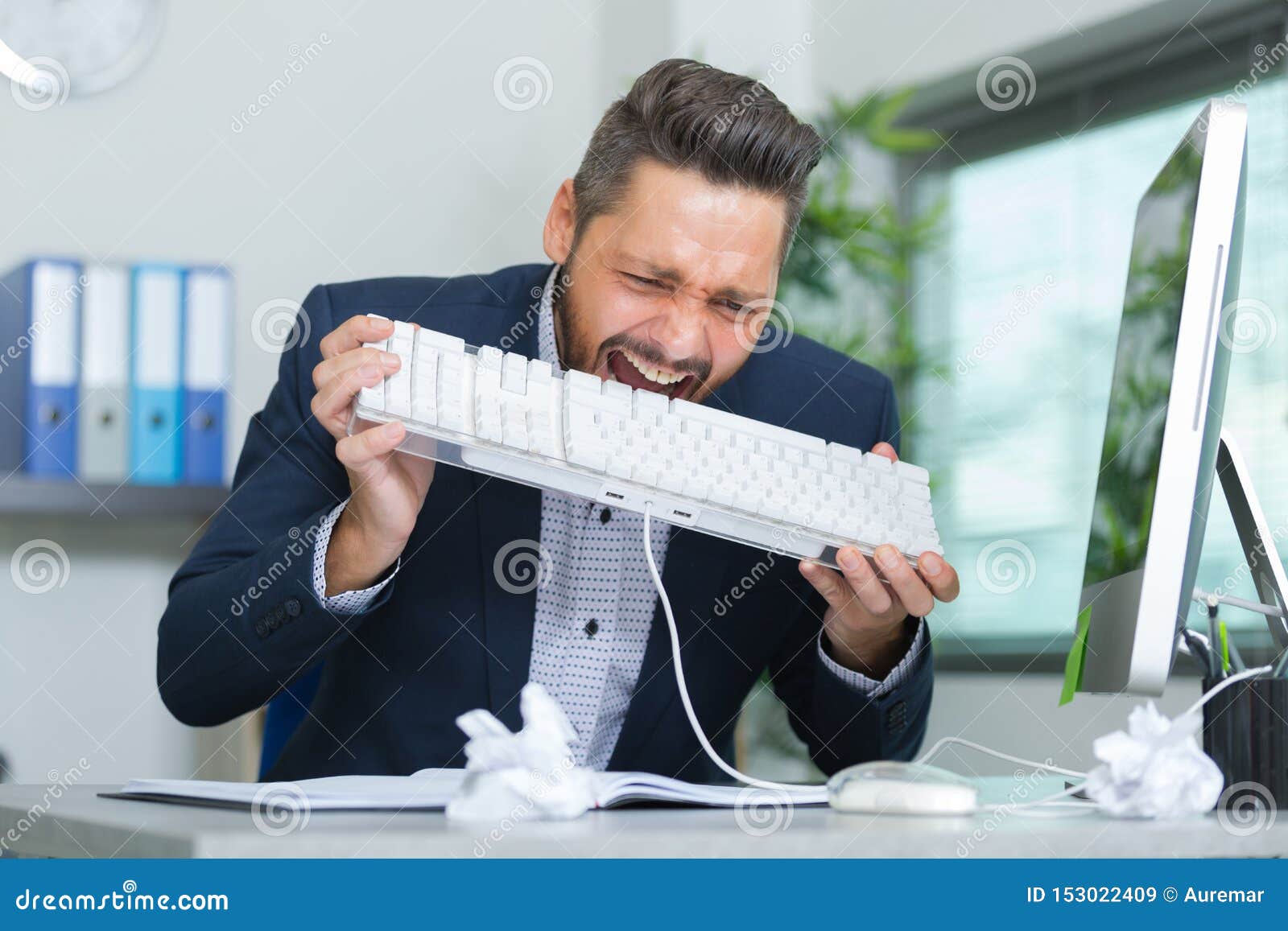 Man Trying To Bite Keyboard Stock Image - Image of geek, horizontal ...