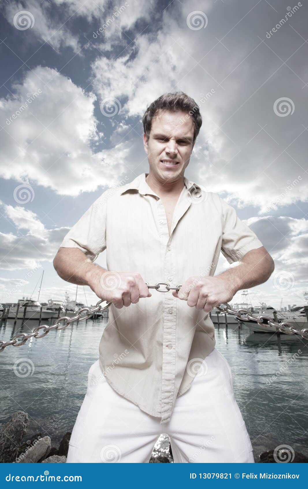 Man Trying To Break the Chains Stock Image - Image of angle, strength ...