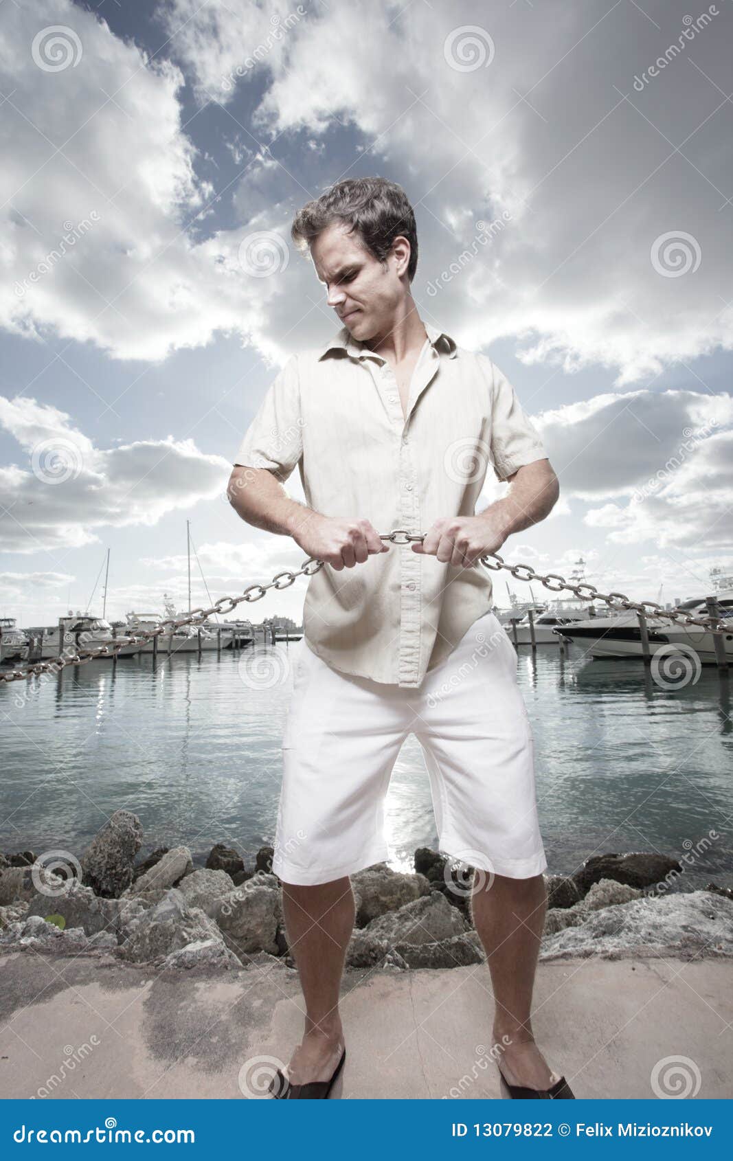 Man Trying To Break the Chains Stock Photo - Image of glare, caucasian ...
