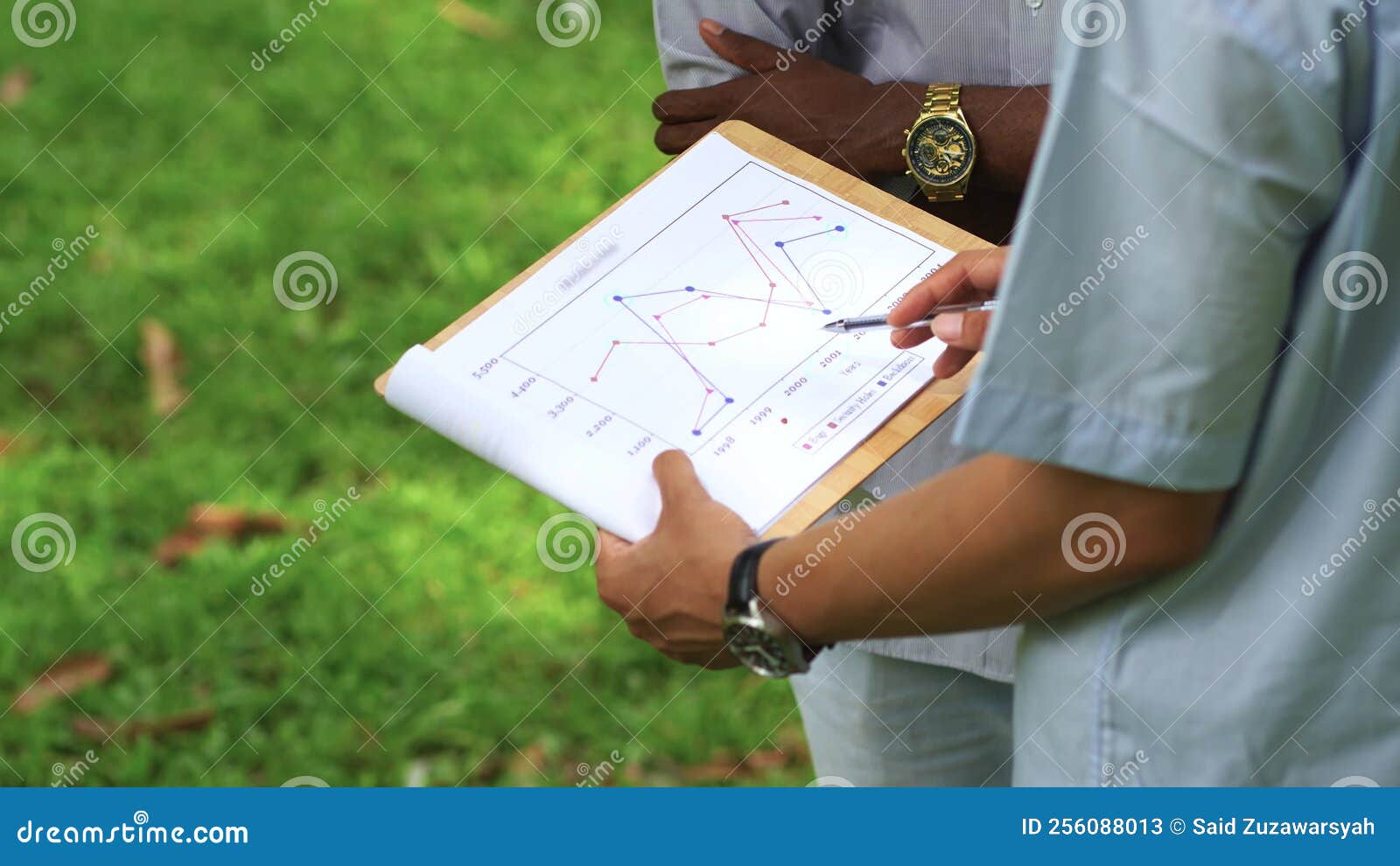 A Man Explaining Information from a Sheet To His Co Worker Stock Video ...