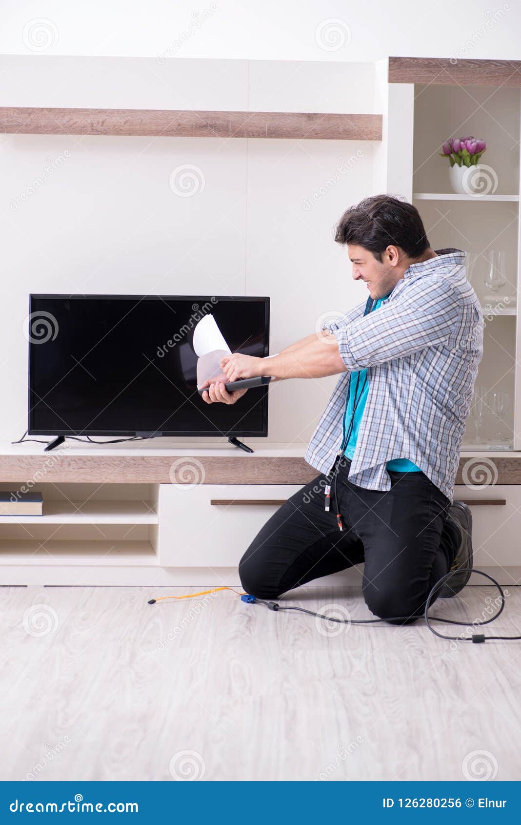 The Man Trying To Fix Broken Tv Stock Photo - Image of electric ...