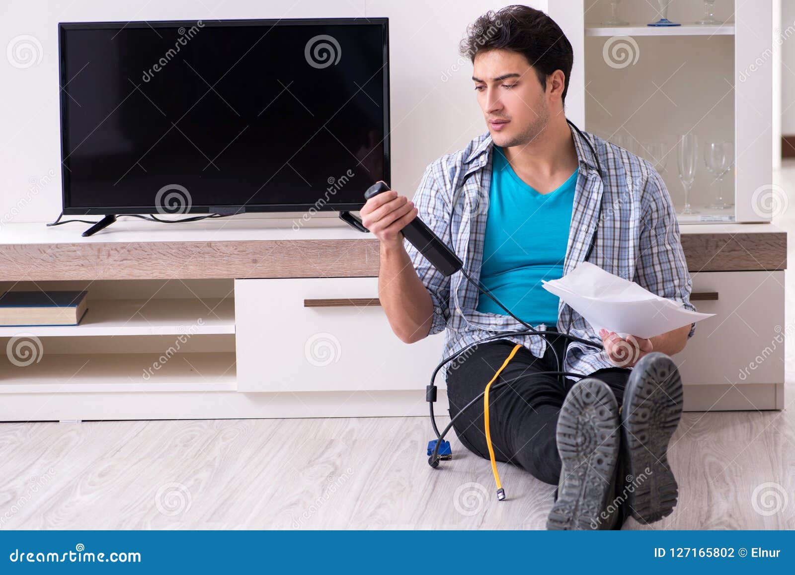 The Man Trying To Fix Broken Tv Stock Photo - Image of electronic ... The Man Trying To Fix Broken Tv Stock Photo - Image of electronic ...