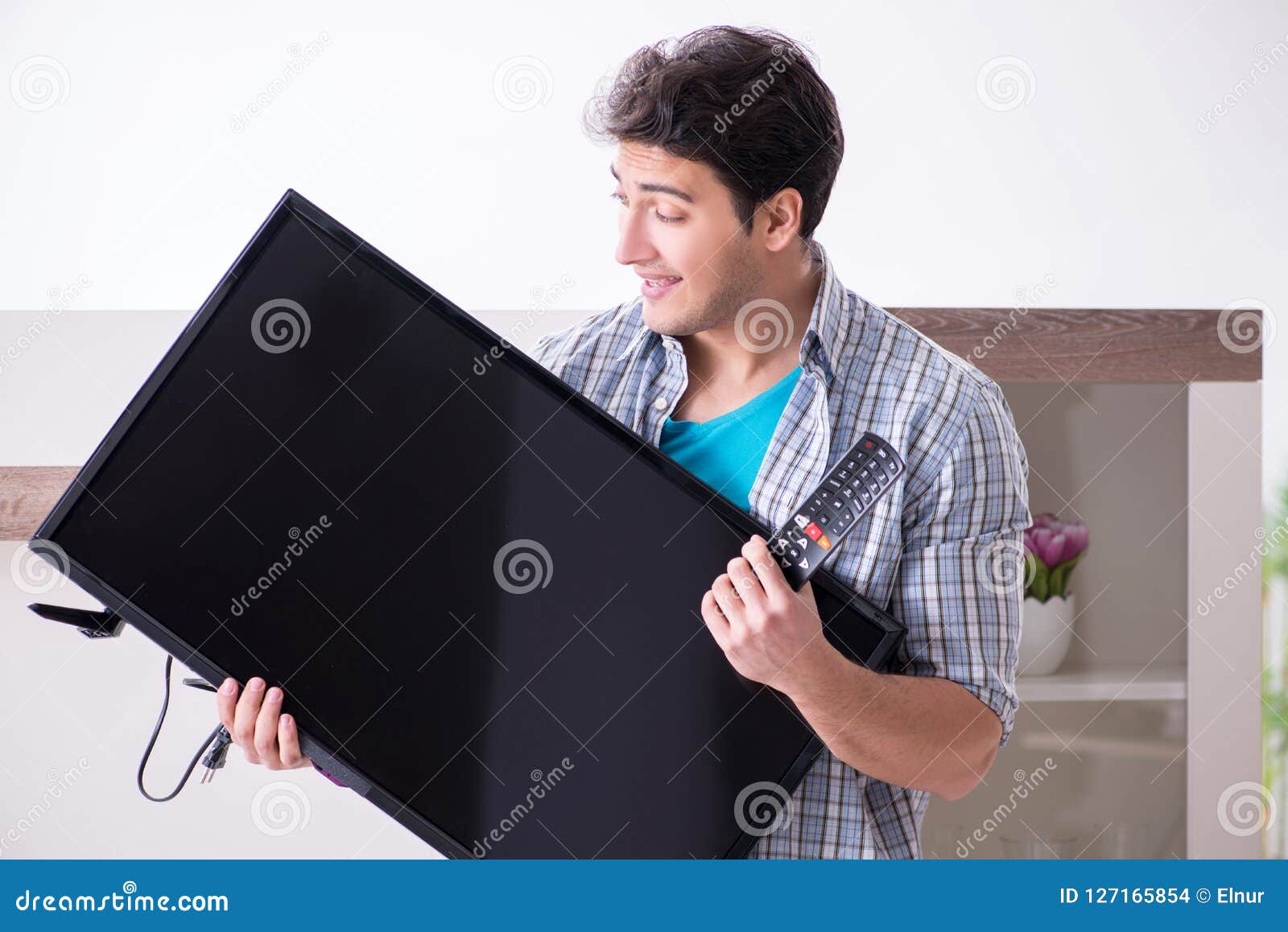 The Man Trying To Fix Broken Tv Stock Photo - Image of home, excited ...