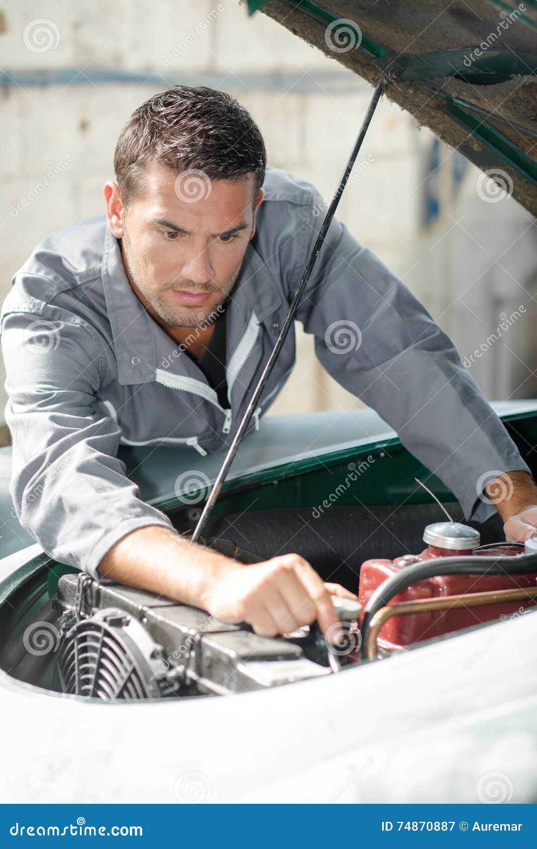 Man trying to fix car stock image. Image of workshop - 74870887