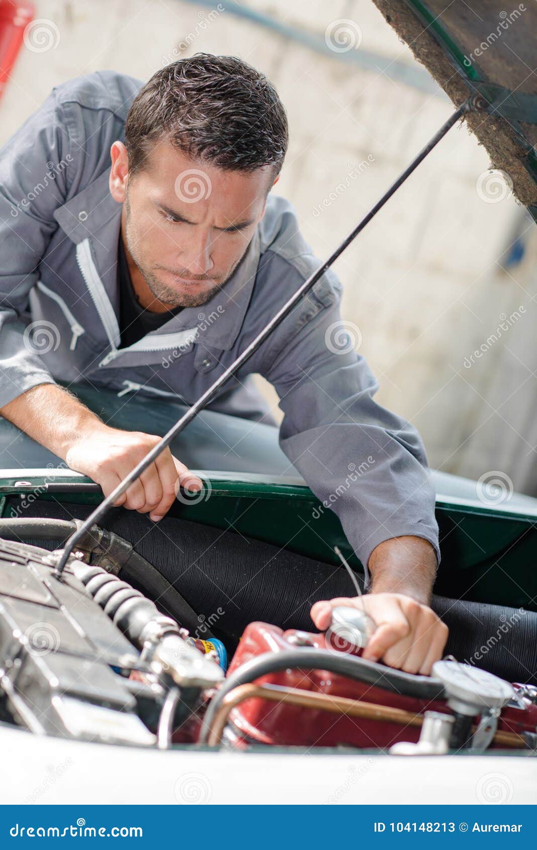 Man trying to fix car stock image. Image of refill, vehicle - 104148213