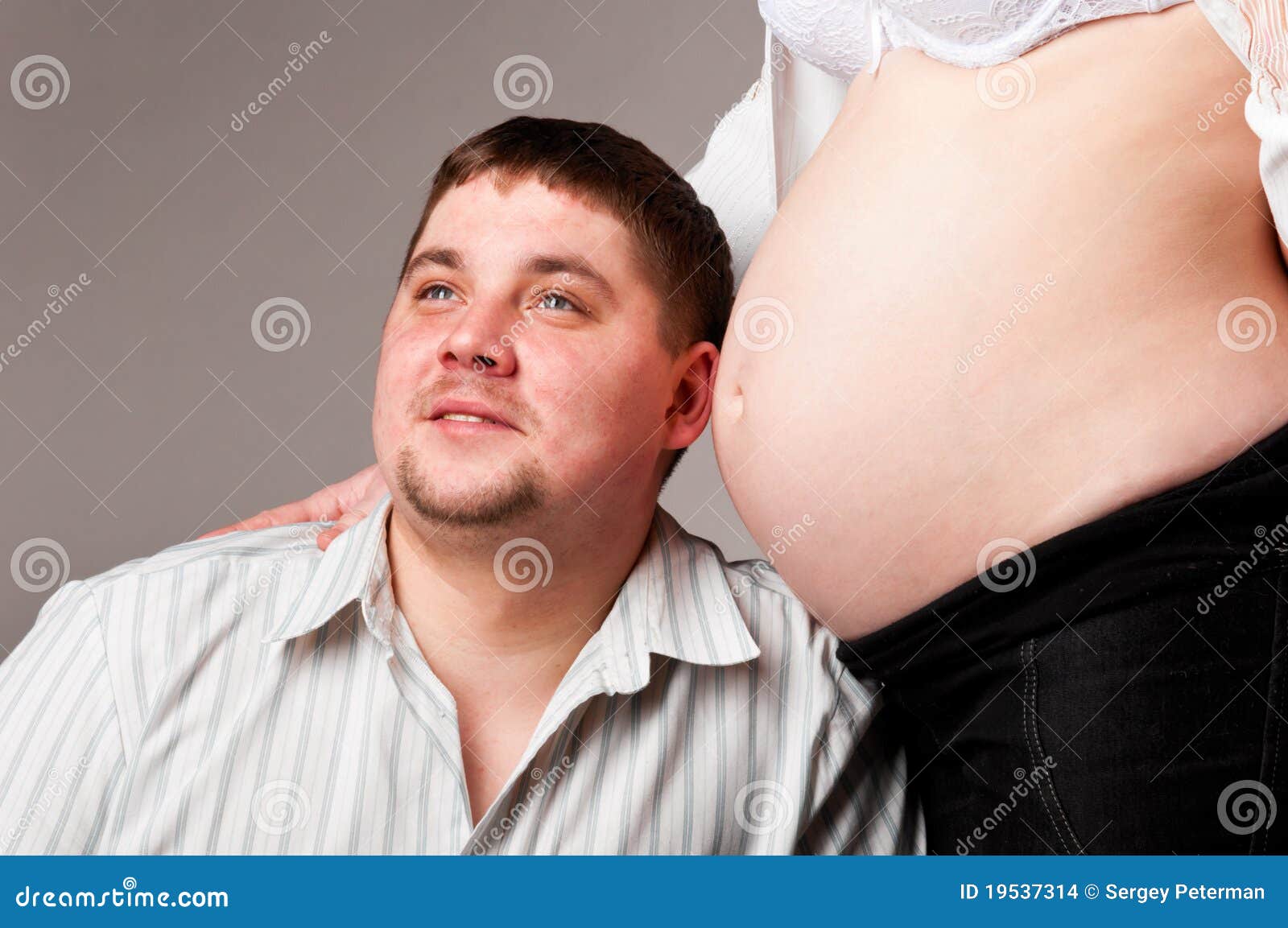 Man is Trying To Listen His Baby Stock Photo - Image of belly, father ...