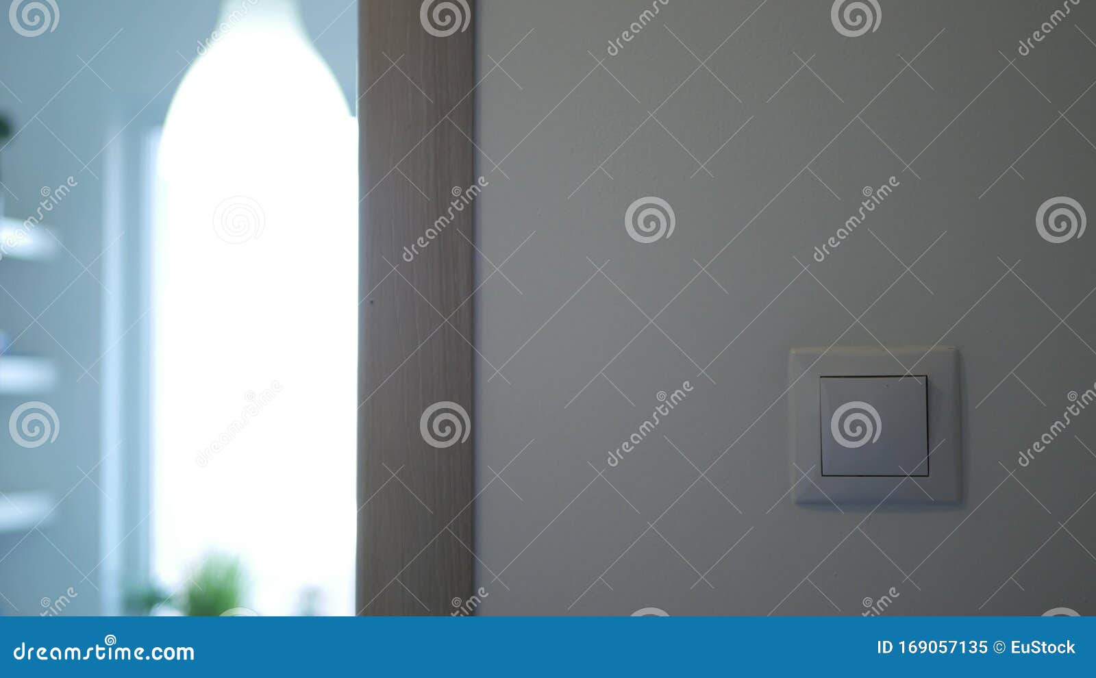 Man Turning on the Light from the Switch on the Wall Stock Video ...