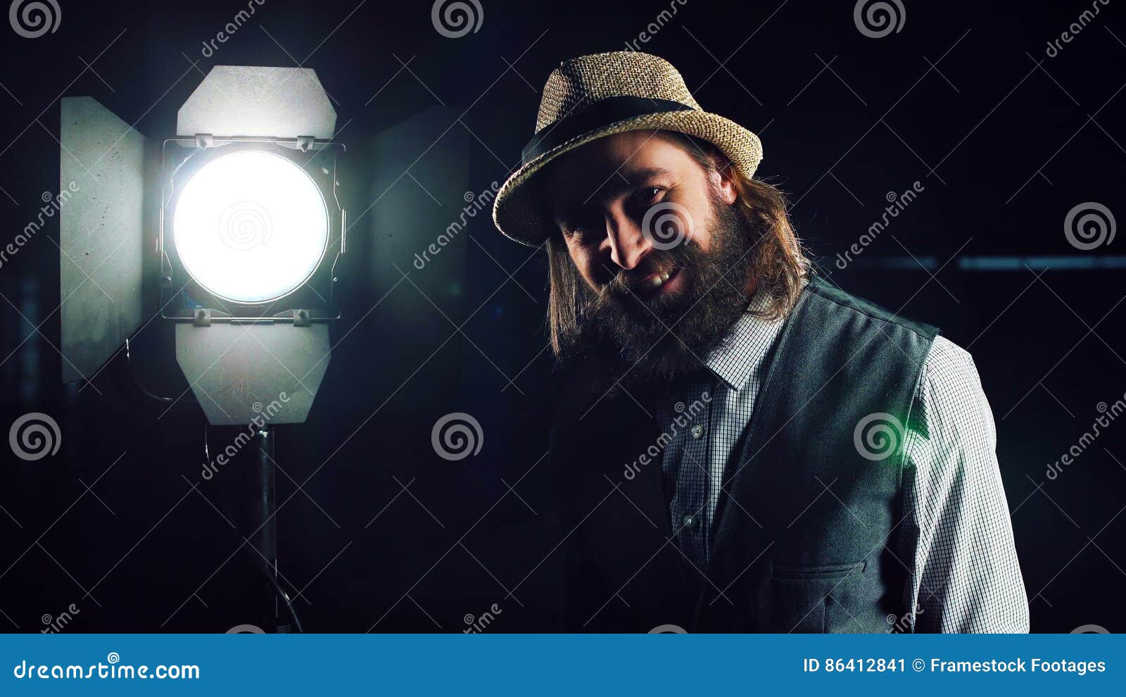 Man Turning on Studio Light Stock Video - Video of closeup, vest: 86412841