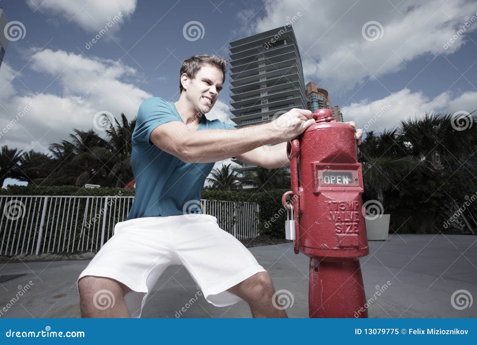 Man turning on the water stock image. Image of power - 13079775