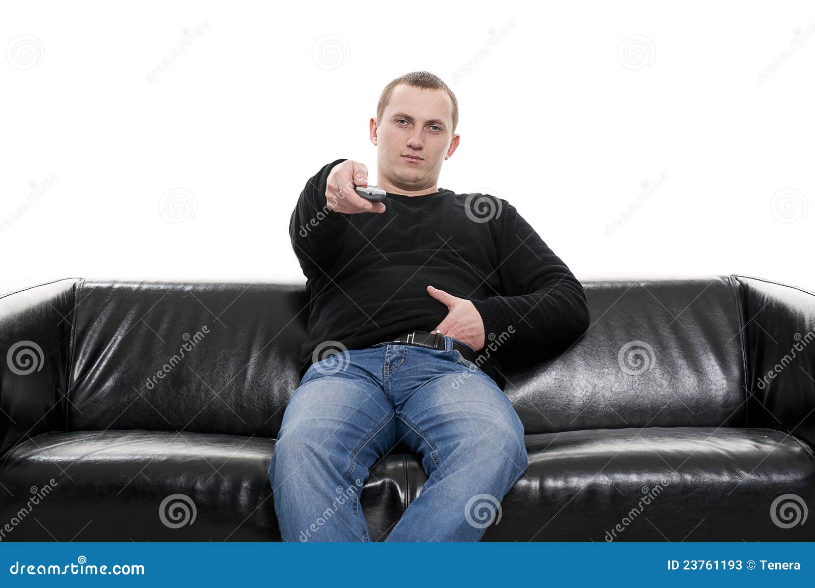 Man with tv remote control stock image. Image of remote - 23761193
