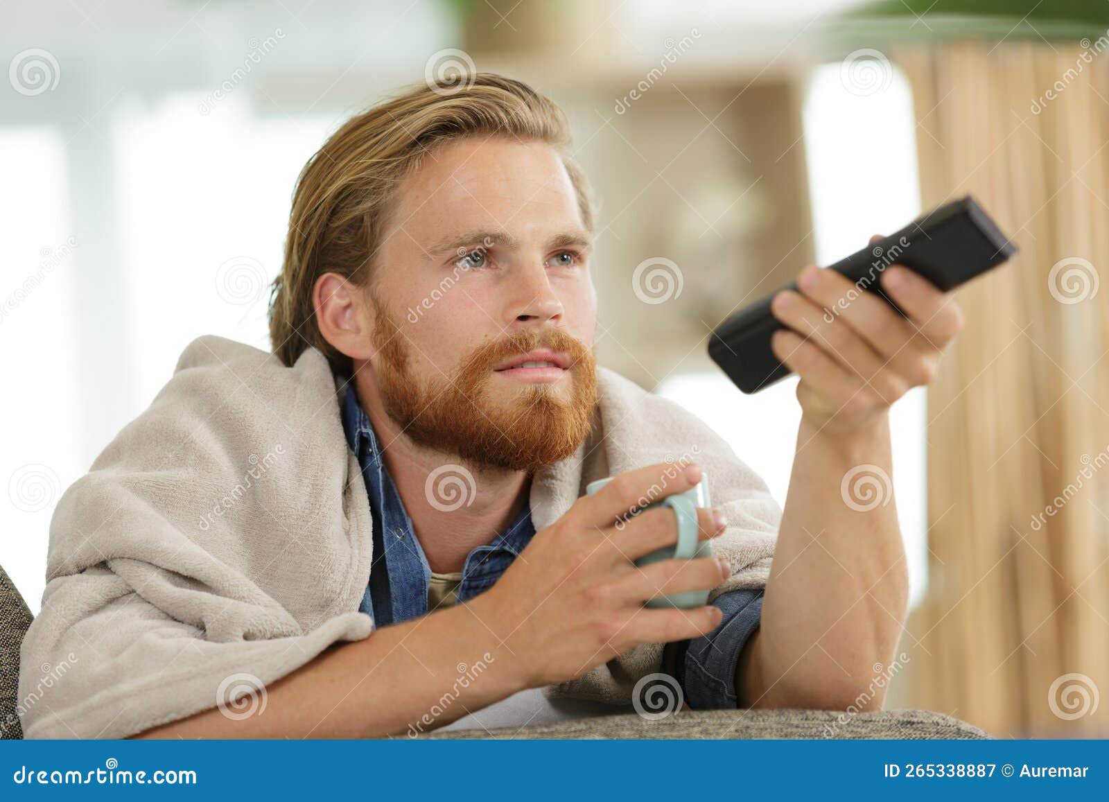 Man with Tv Remote Control at Home Stock Image - Image of male, casual ...