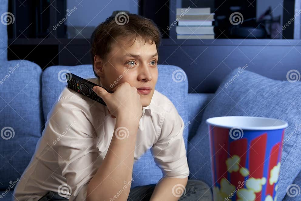 Man with Tv Remote Control at Home Stock Photo - Image of holding ...