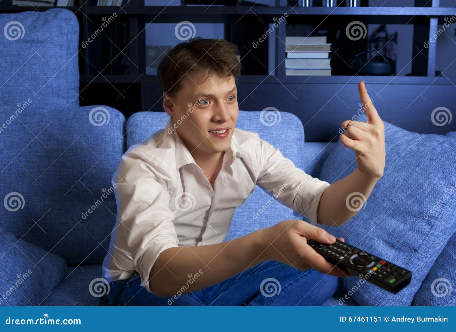 Man with Tv Remote Control at Home Stock Image - Image of living ...