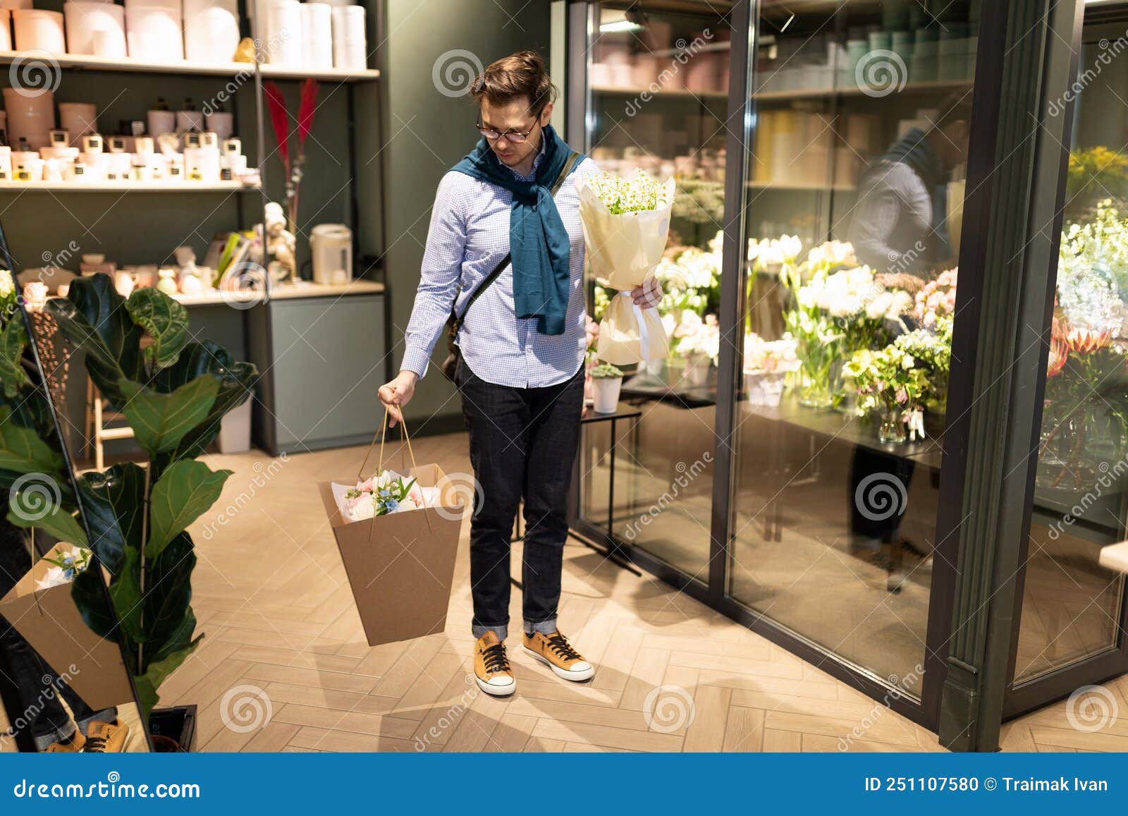 Man with Two Bouquets in a Flower Shop Stock Photo - Image of adult ...