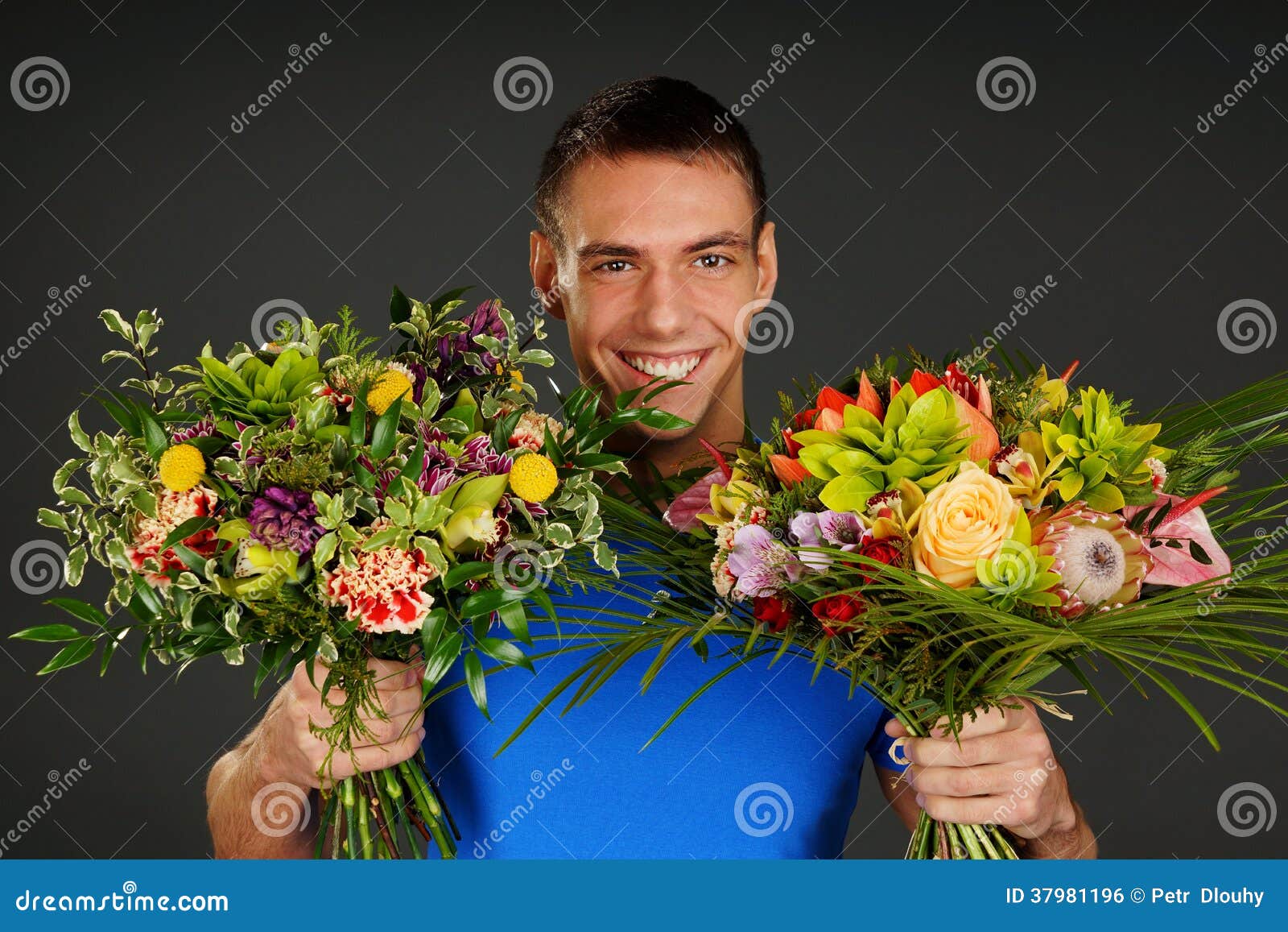 Man with two flowers stock photo. Image of elegance, blue - 37981196