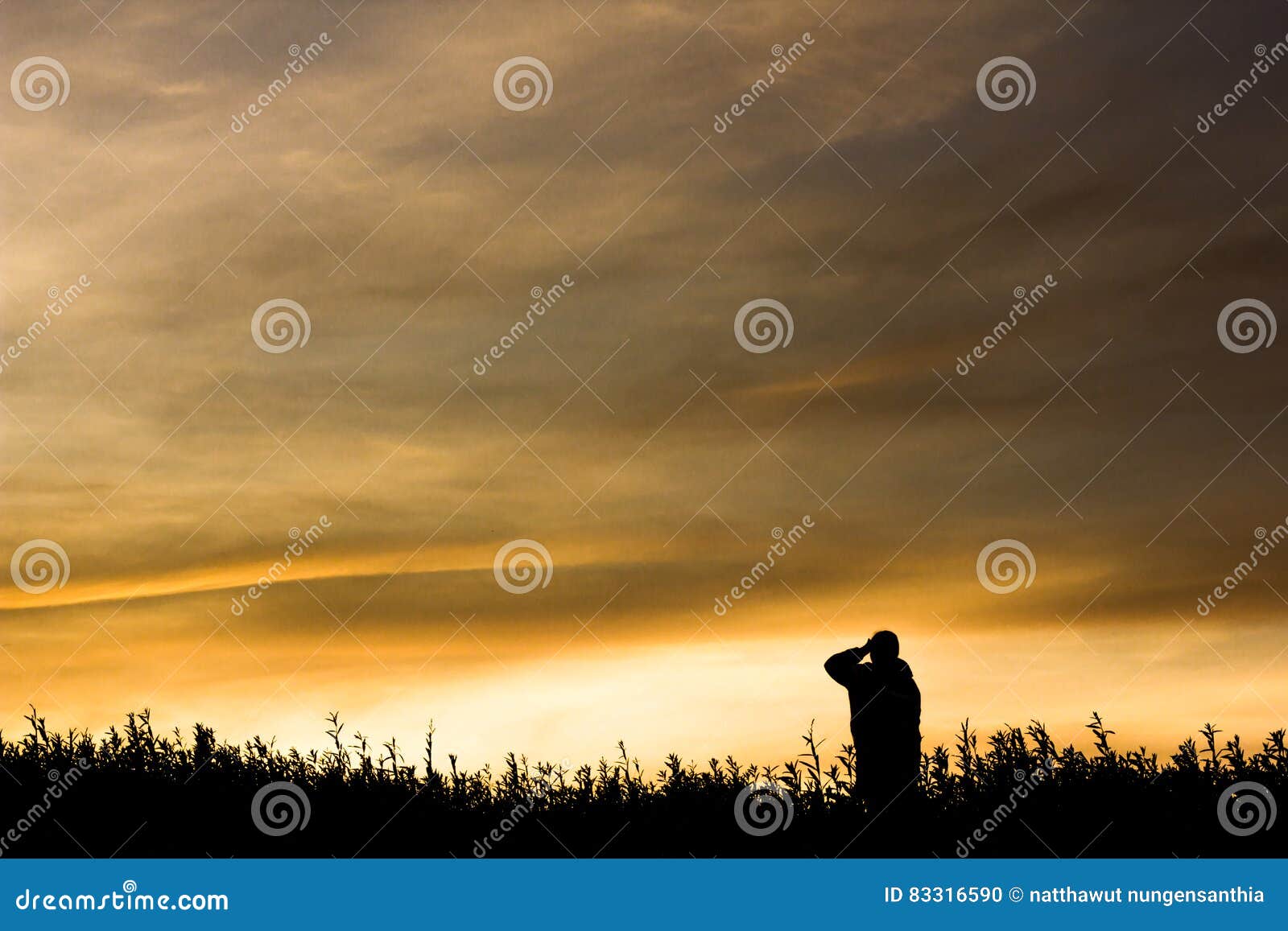 Man and Two Women Stood Watching the Sunset Stock Photo - Image of ...