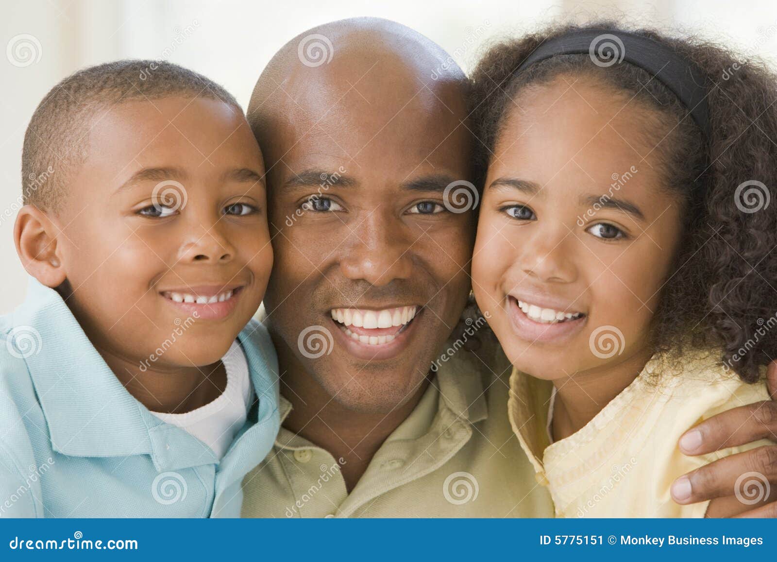 Man and Two Young Children Embracing and Smiling Stock Image - Image of ...