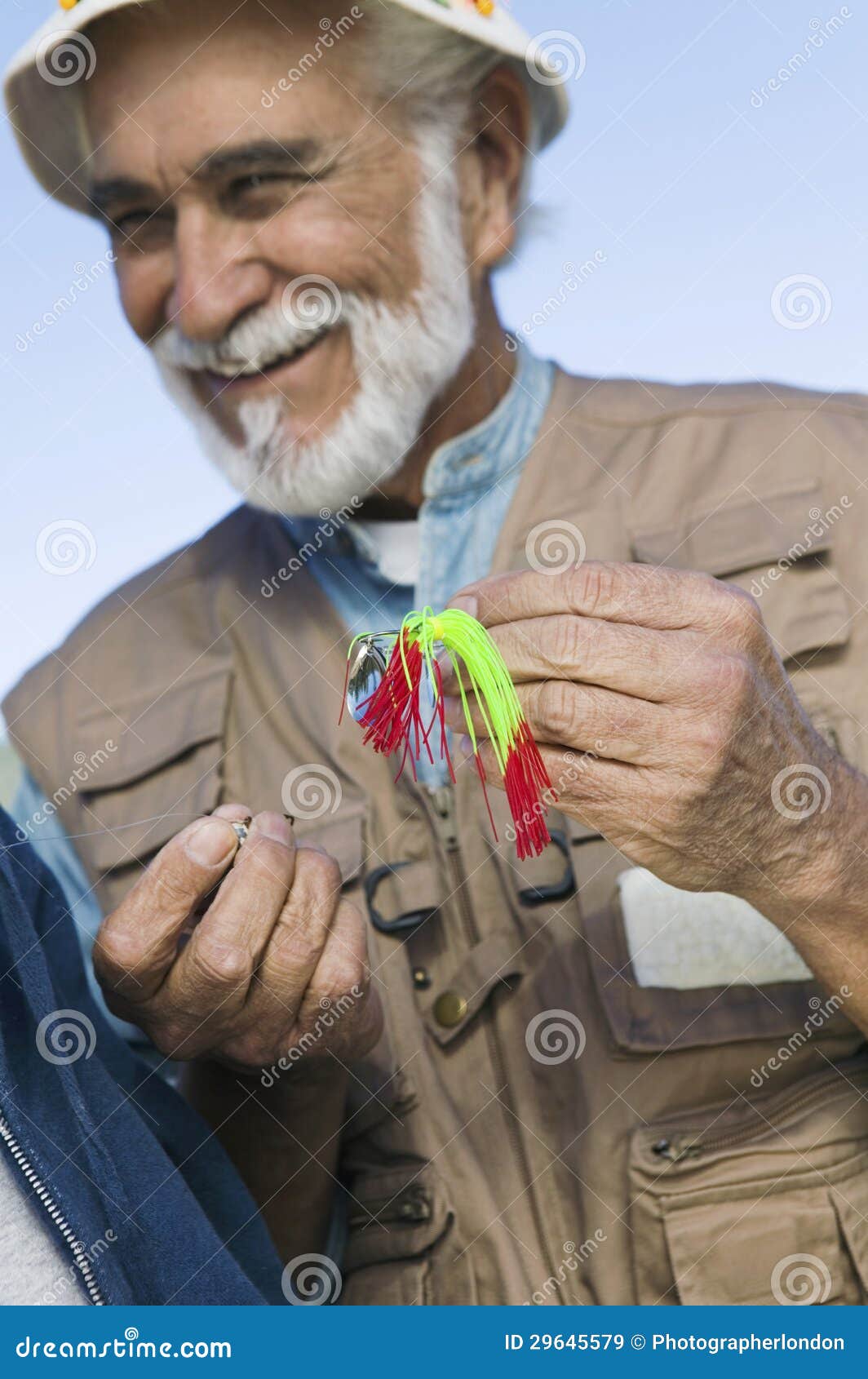 Man Tying a Fly Fishing Lure Stock Image - Image of hobby, adult: 29645579