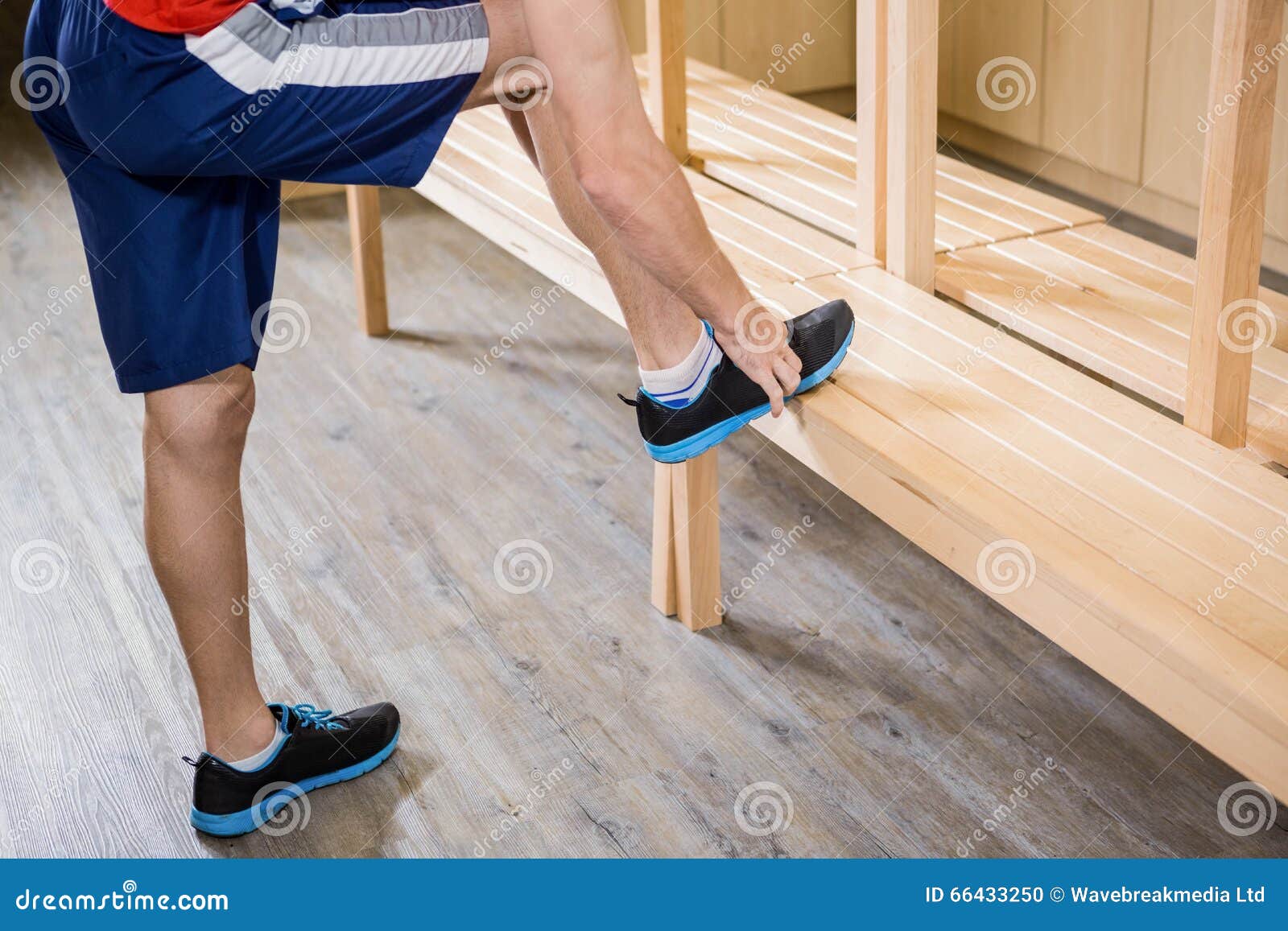 Man Tying Shoelace in Locker Room Stock Photo - Image of health ...