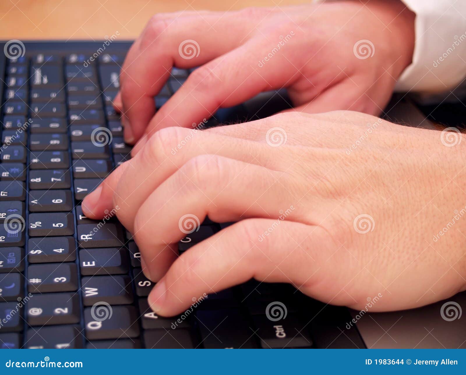 Man Typing stock photo. Image of notebook, keys, cuff - 1983644