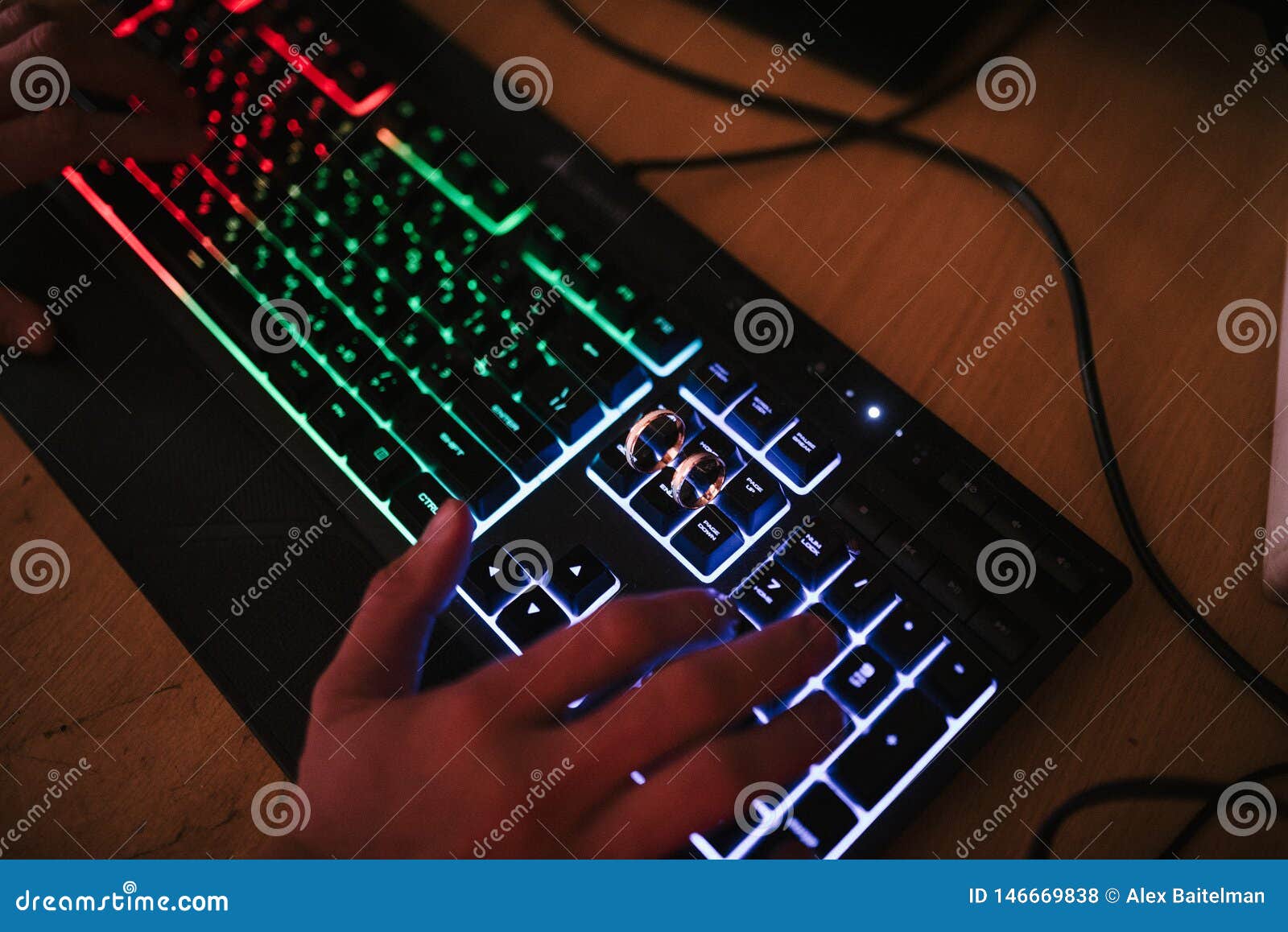 Man Typing on a Backlit Keyboard Close Up Stock Photo - Image of ...