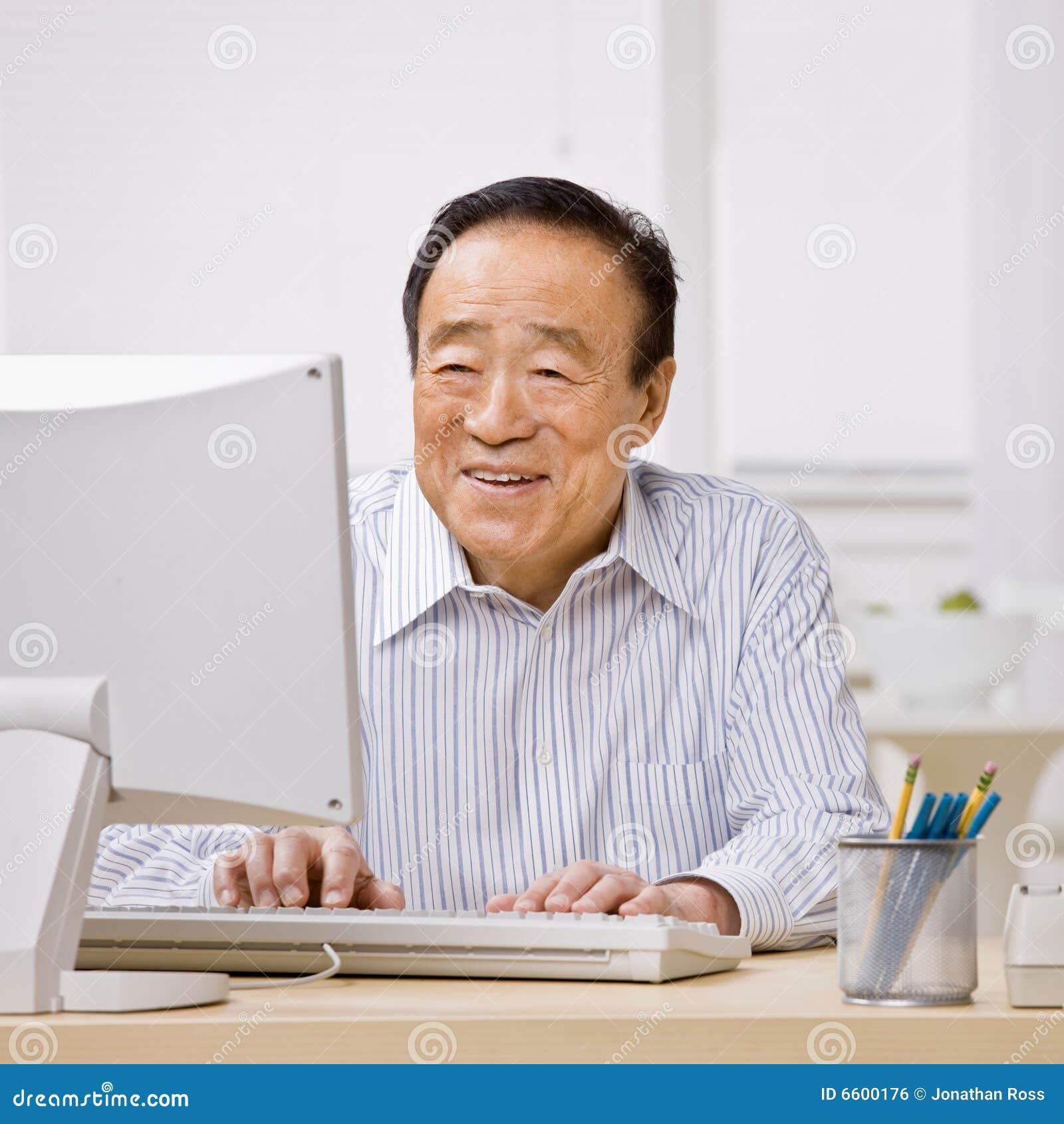 Man typing on computer stock photo. Image of ageing, domestic - 6600176