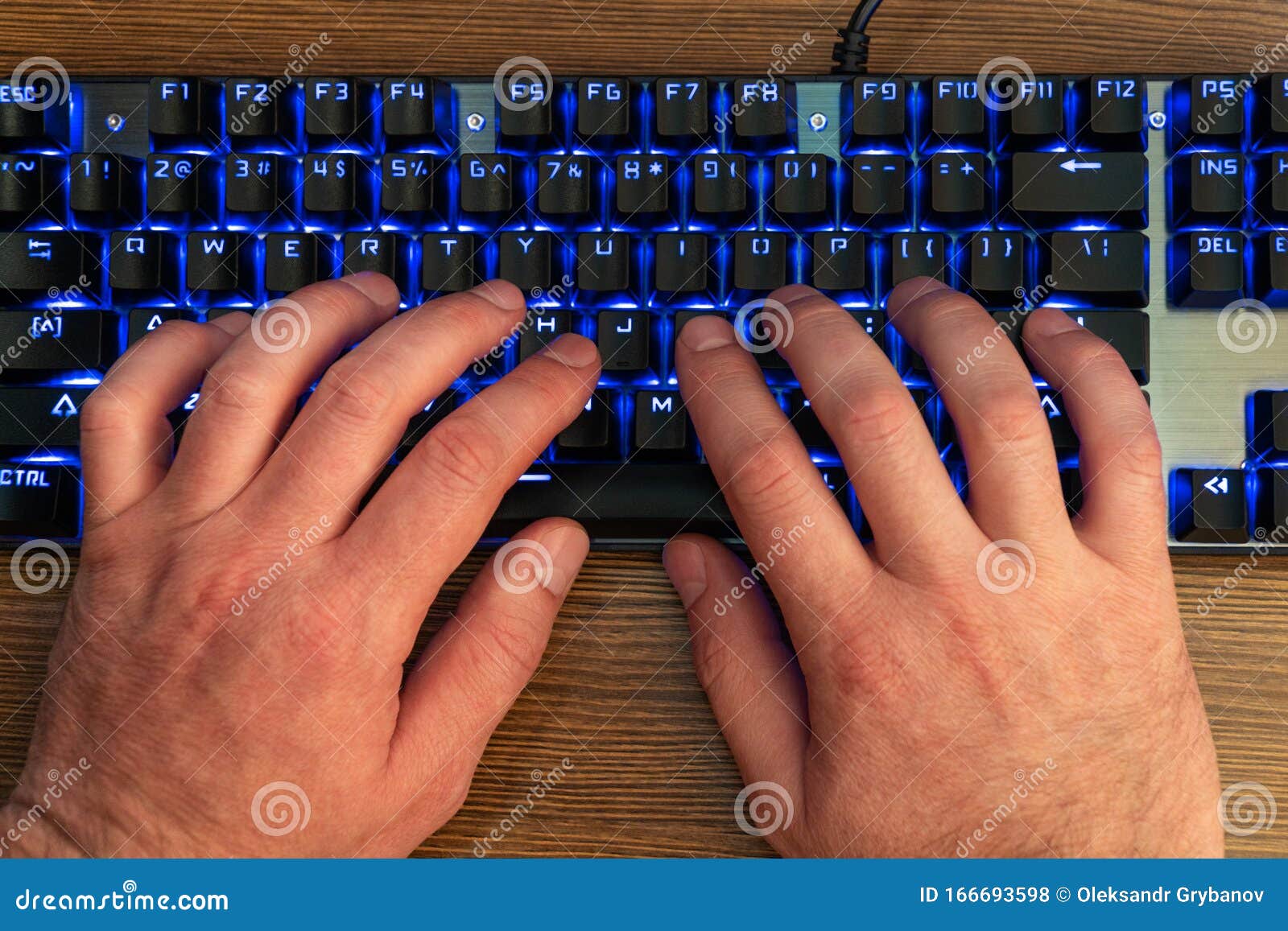 Man is Typing on the Keyboard Stock Photo - Image of keypad, blue ...