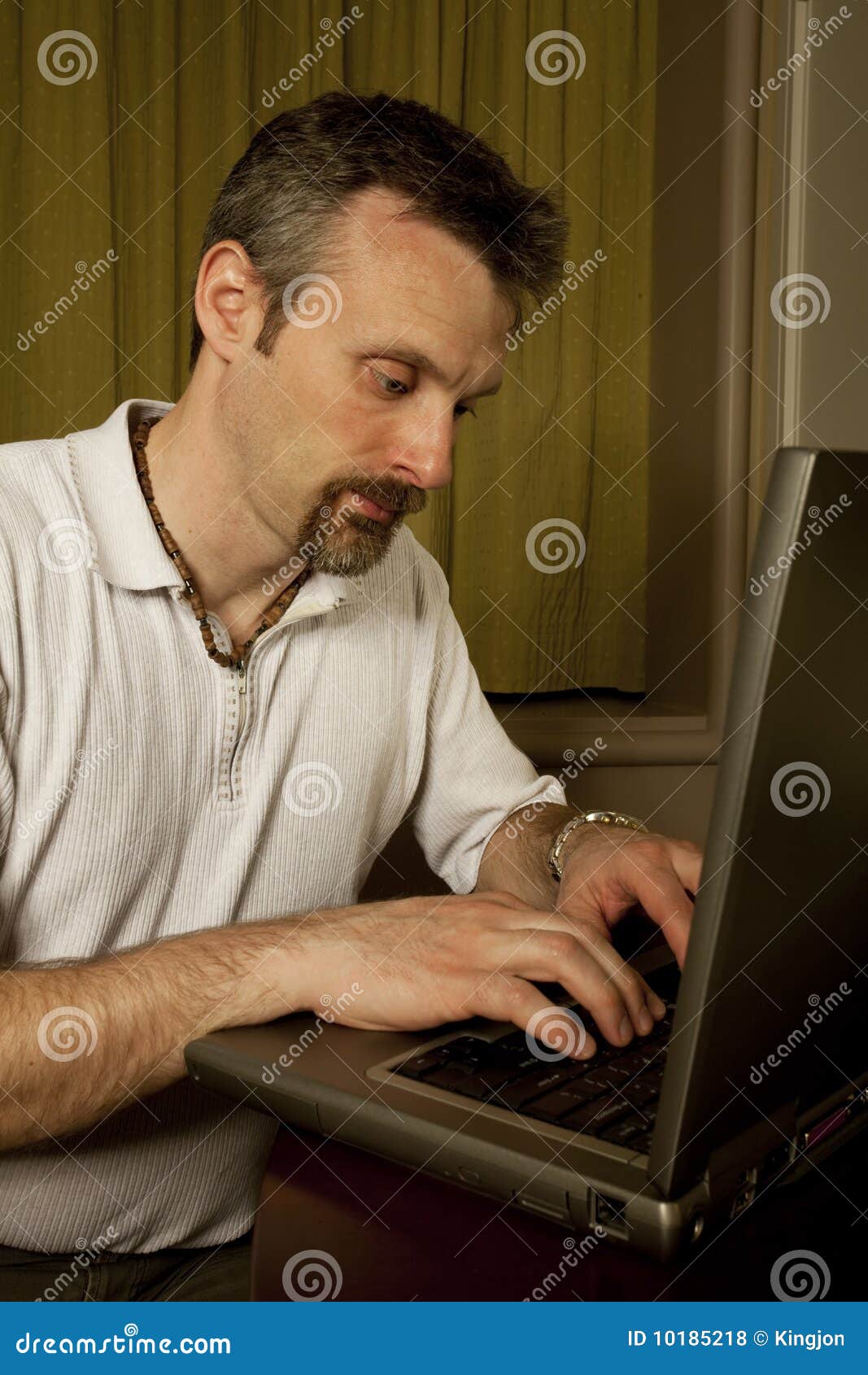Man typing on a laptop stock photo. Image of closeup - 10185218