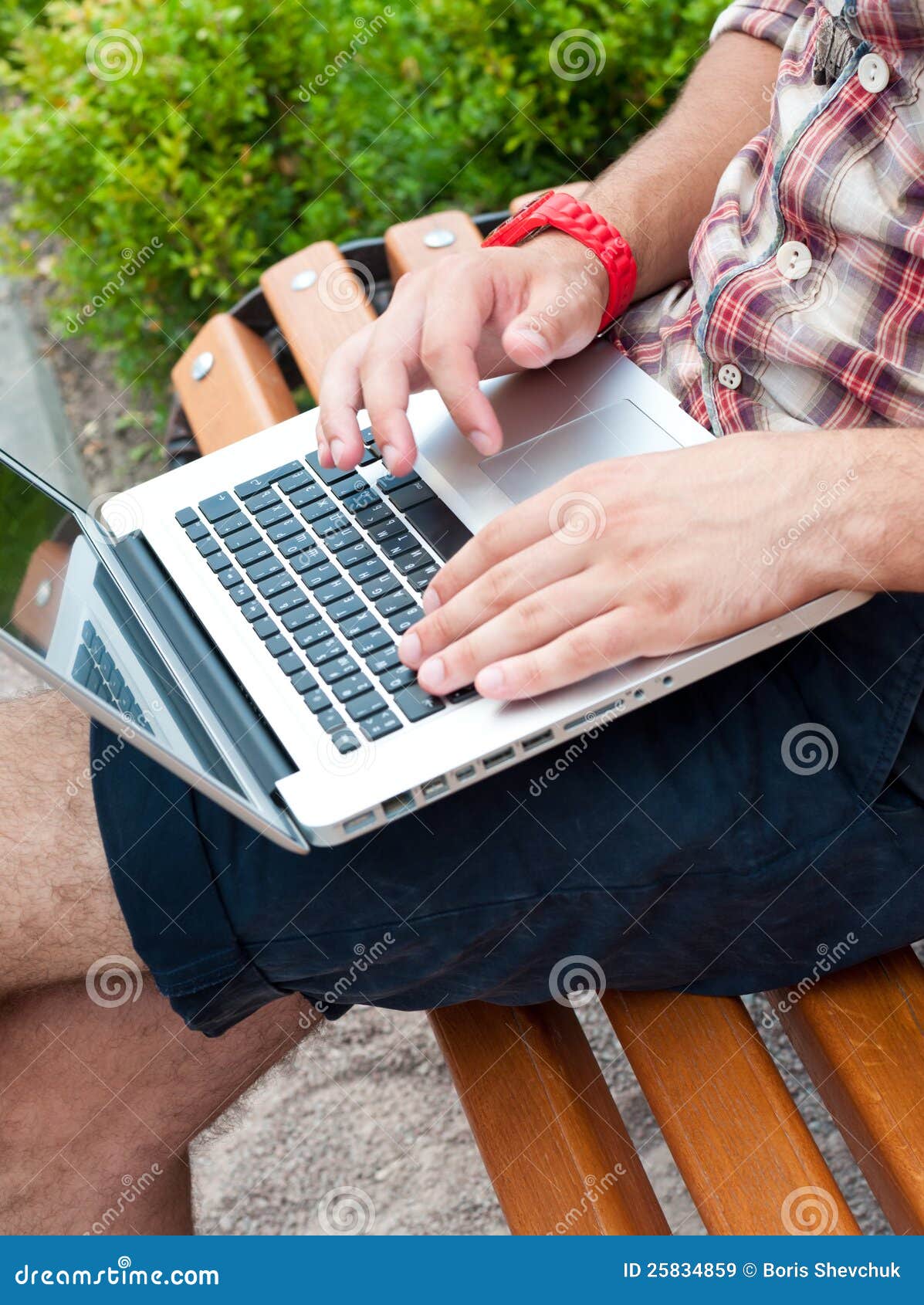 Man typing on laptop. stock image. Image of wireless - 25834859