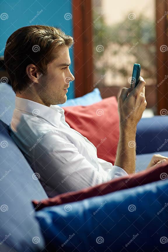 Man Typing Sms on Cellphone Stock Photo - Image of concentration, cell ...