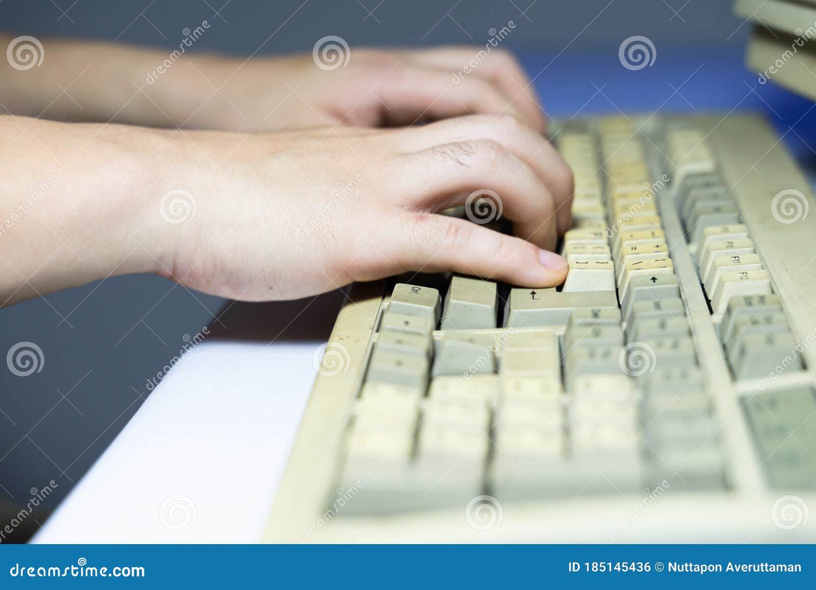 A Man is Typing and Using an Old Personal Computer . Stock Photo ...