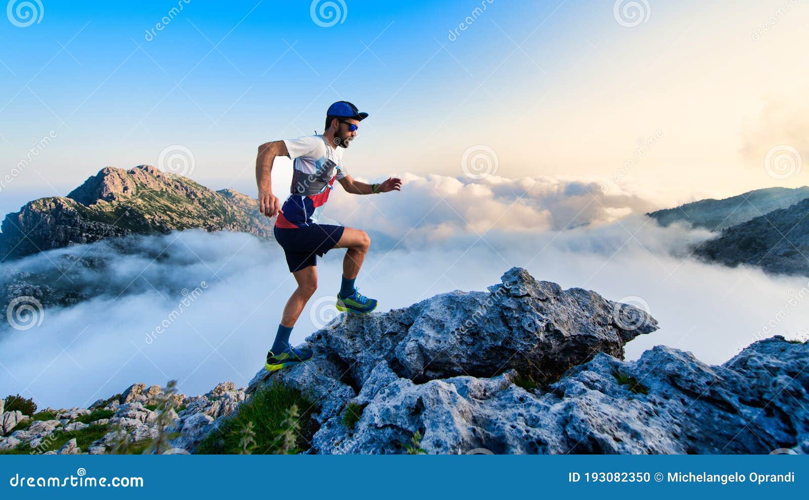 Man Ultramarathon Runner in the Mountains during a Workout Stock Photo ...