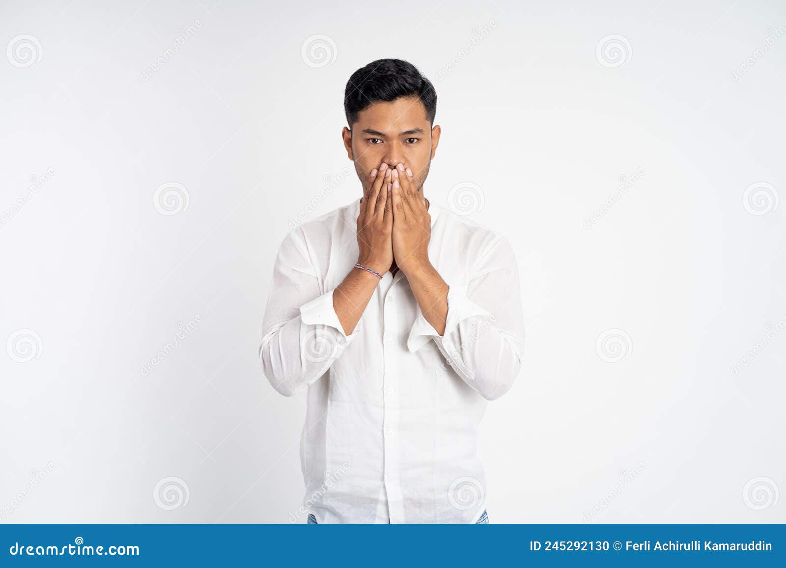 Man with Uncomfortable Expression with Two Hands Covering Mouth Stock ...
