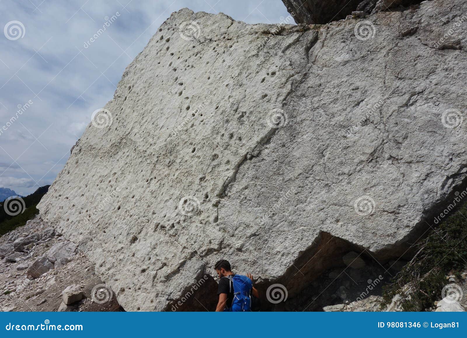 Man Under Fossil Rock on Pelmo Peak Editorial Photo - Image of tourism ...