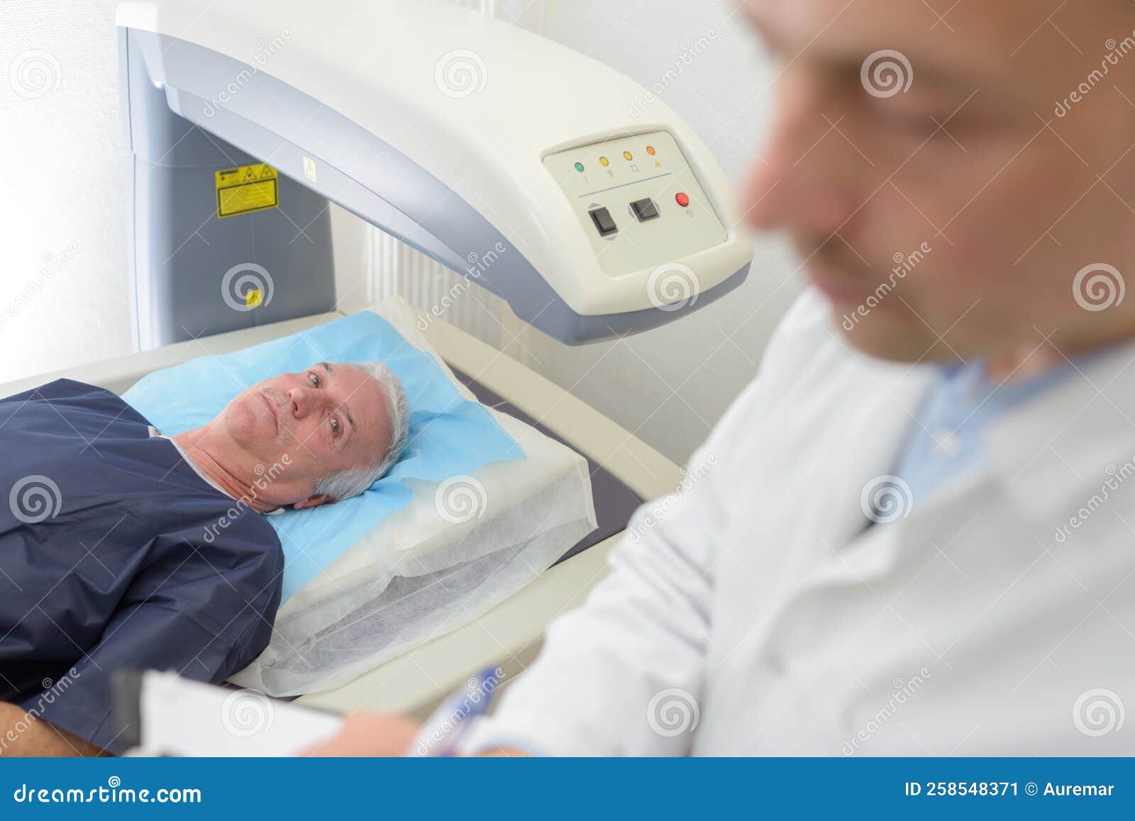 Man under scanning machine stock image. Image of diagnostic - 258548371