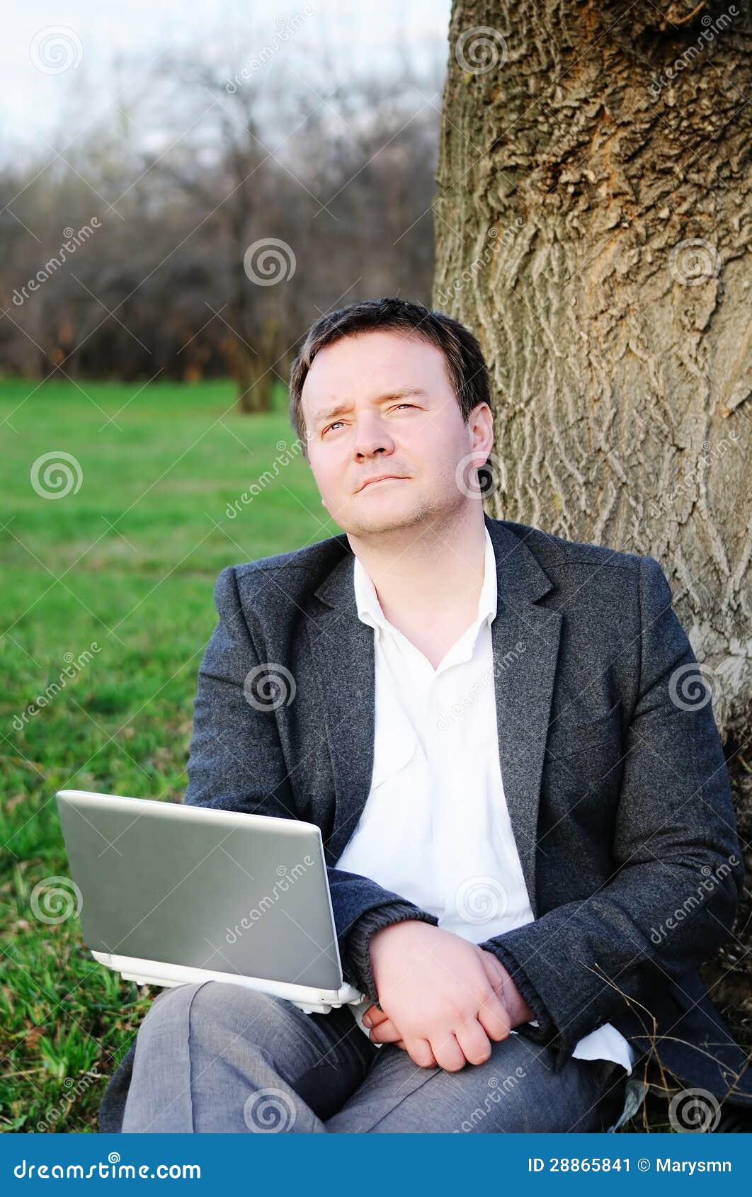 Man under a tree stock image. Image of mobile, internet - 28865841