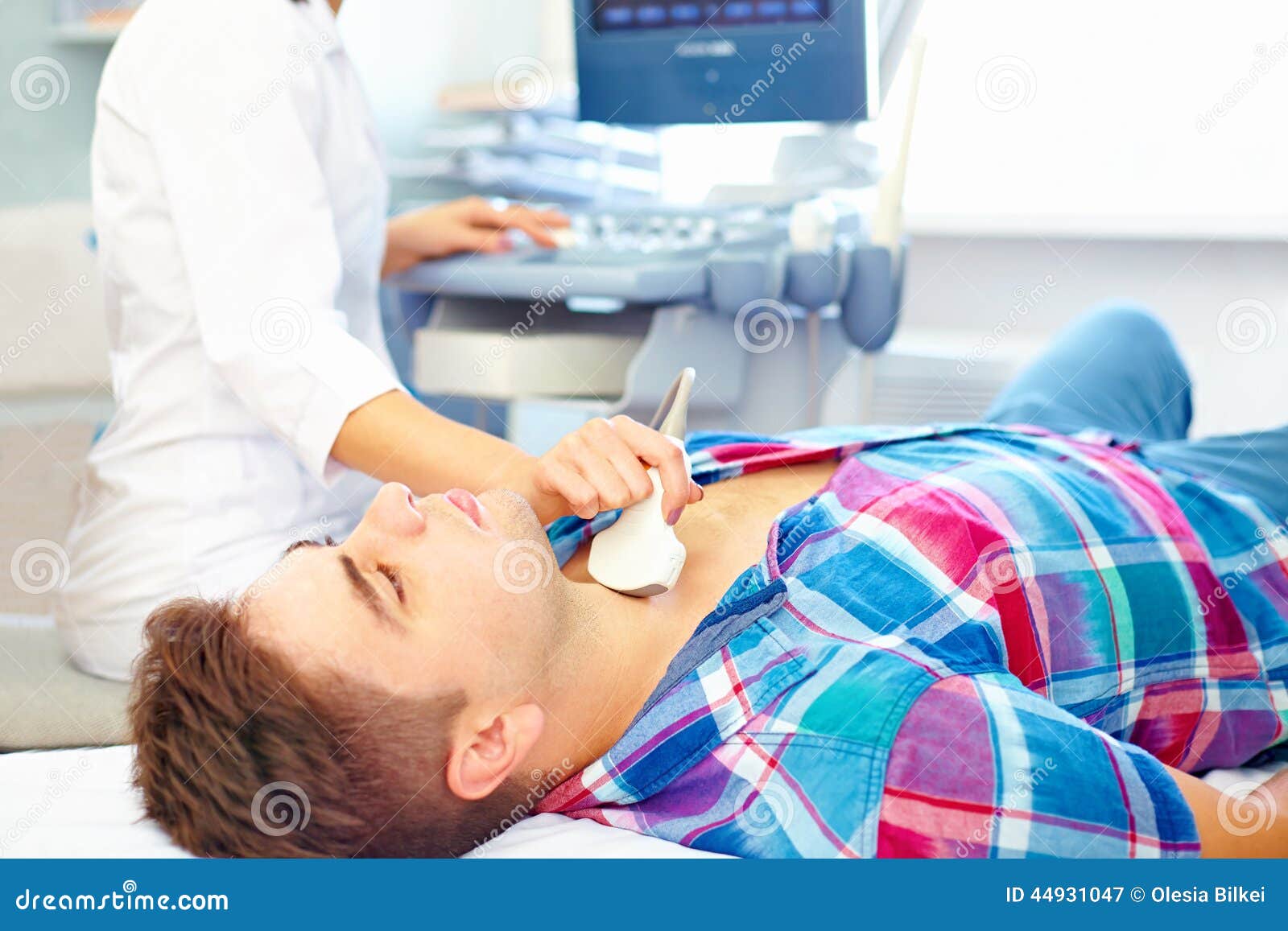 Man Undergoing The Medical Ultrasound Examination Stock Photo - Image ...