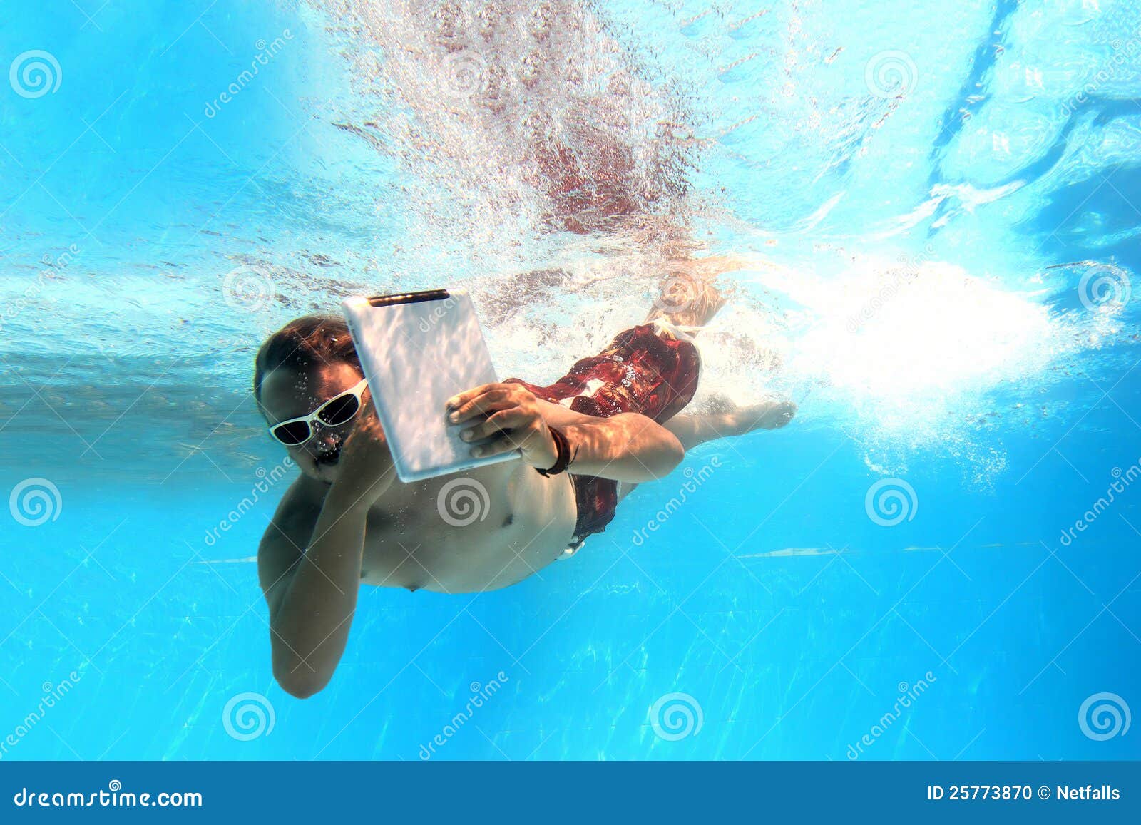 Man Underwater with Tablet PC Stock Photo - Image of swimming, blue ...