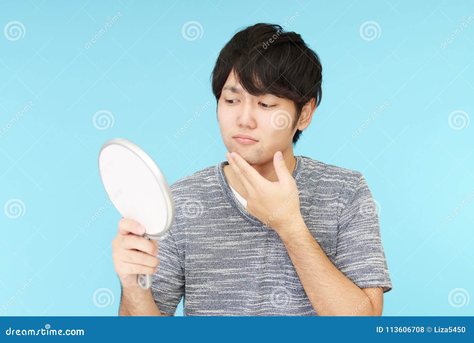 Man with an uneasy look stock photo. Image of hand, care - 113606708