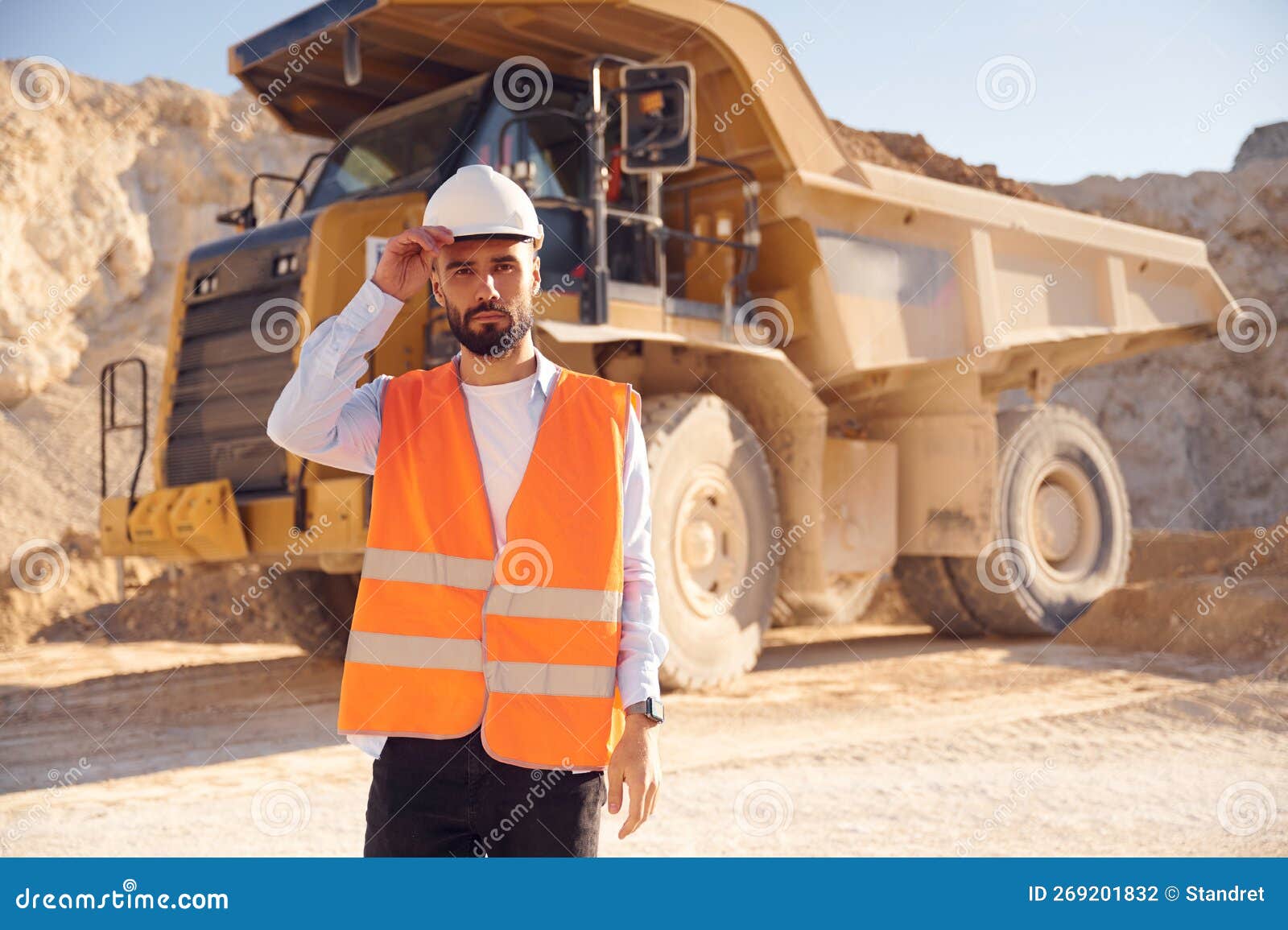 Man in Uniform is Working in the Quarry at Daytime Stock Photo - Image ...