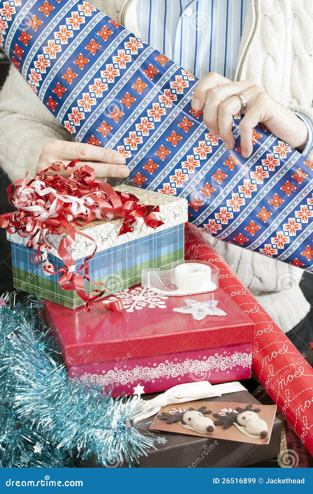 Man Unrolling Wrapping Paper Stock Image - Image of holiday, blue: 26516899