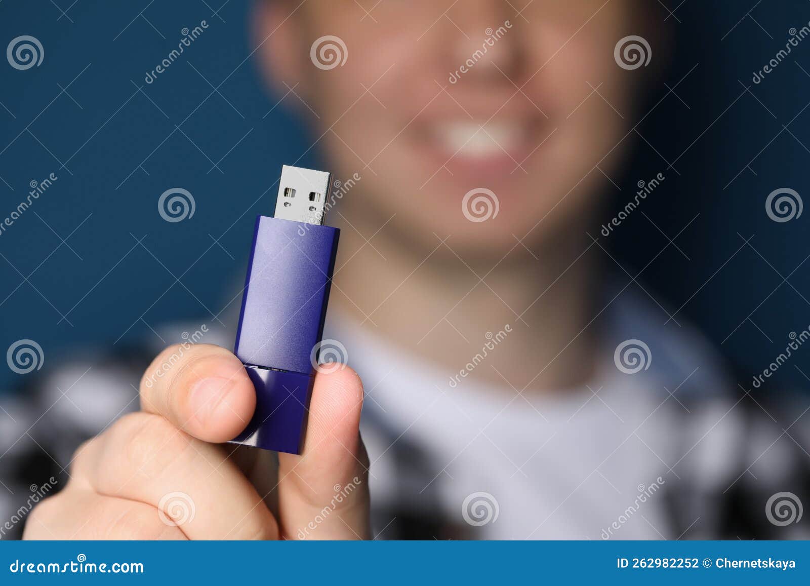 Man with Usb Flash Drive on Blue Background, Closeup. Space for Text ...