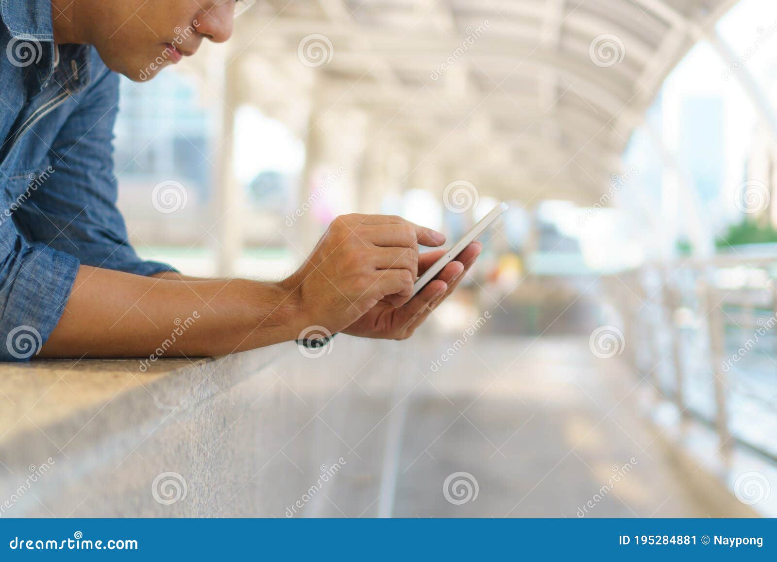 Man use of mobile phone stock image. Image of phone - 195284881