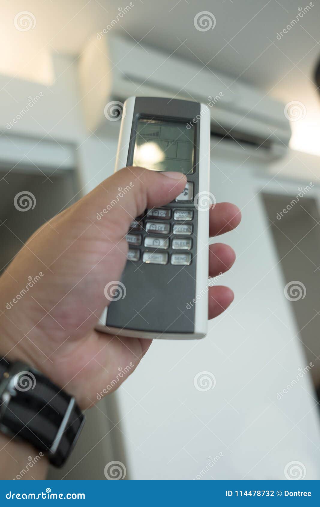 A Man Use Remote Controller Stock Photo - Image of operating, cooler ...
