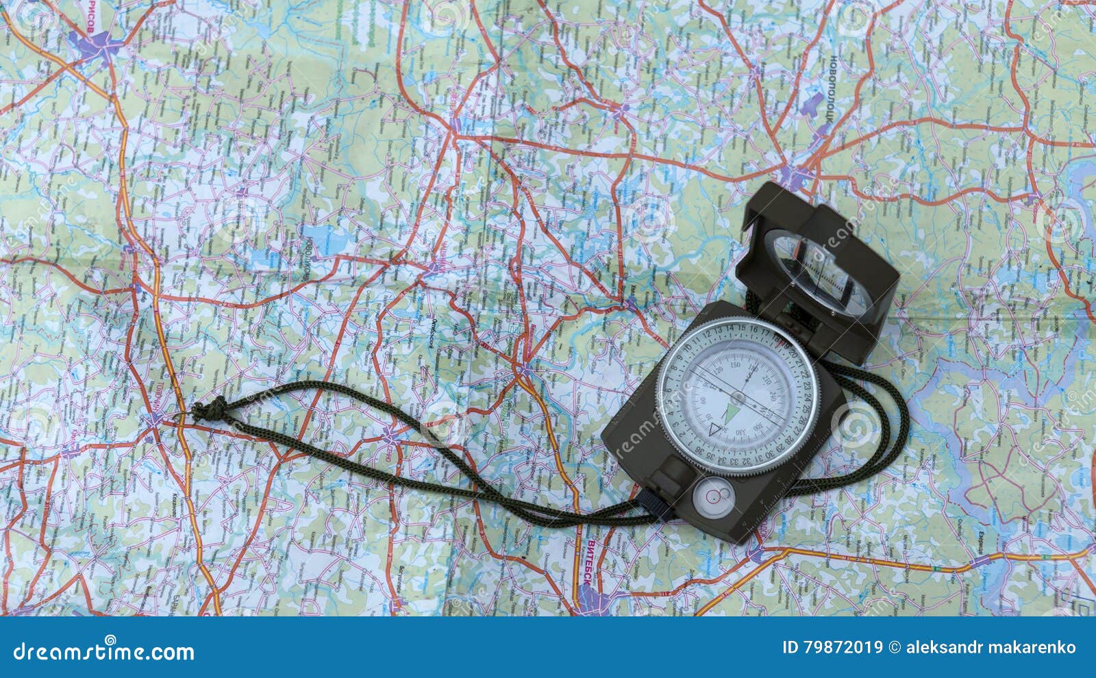 Man Uses a Compass in the Woods Stock Image - Image of equipment ...