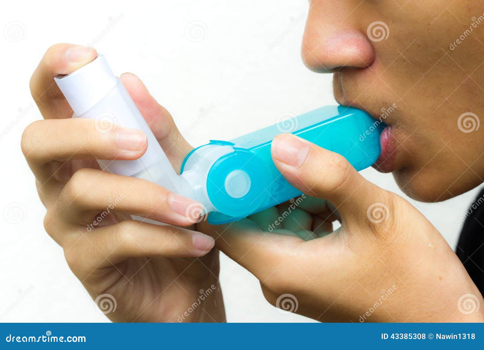 Man uses an inhaler editorial stock photo. Image of care - 43385308
