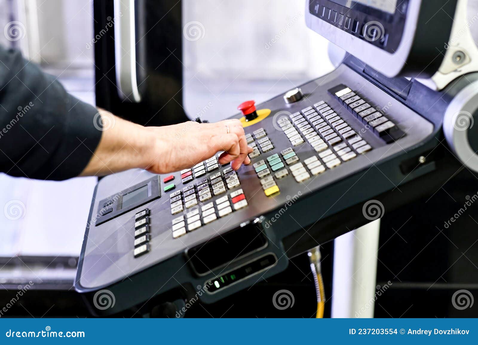 The Man Uses the Remote Control from the CNC Machine Stock Photo ...