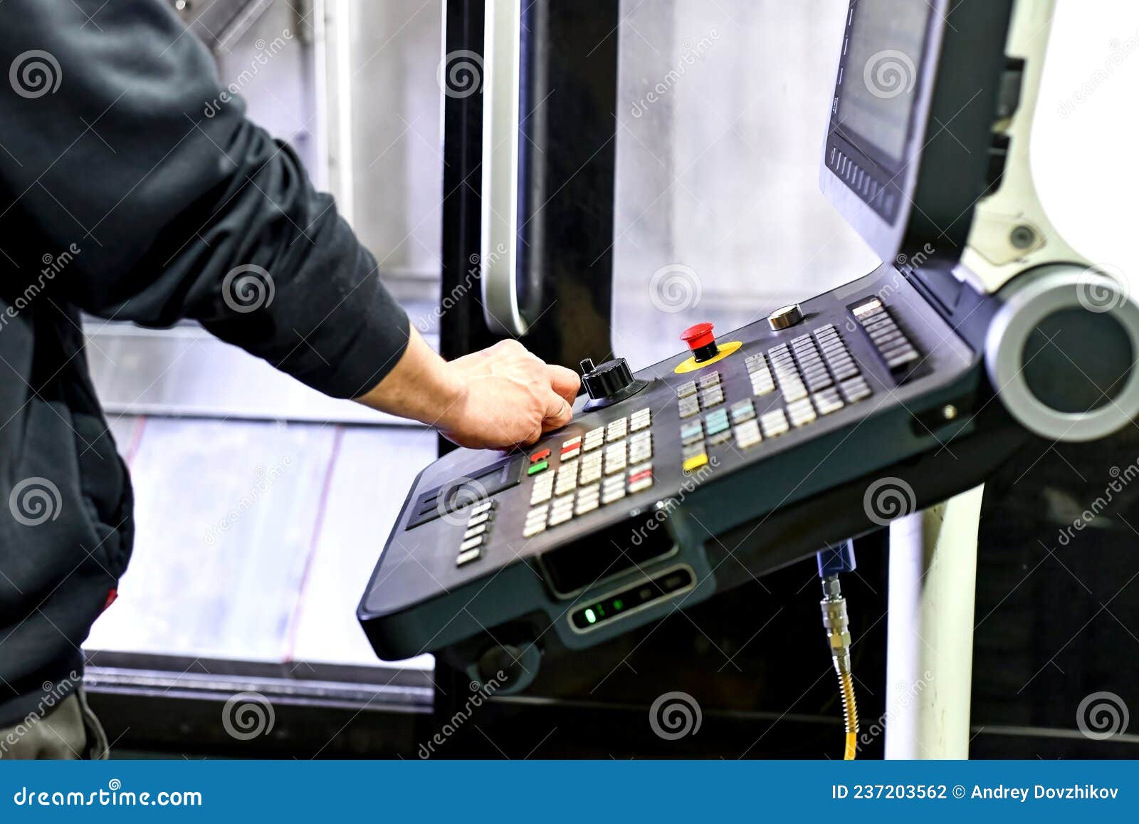 The Man Uses the Remote Control from the CNC Machine Stock Photo ...