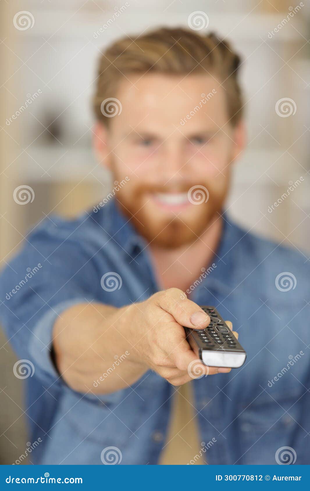 Man Uses Remote Control while Watching Tv Stock Photo - Image of change ...